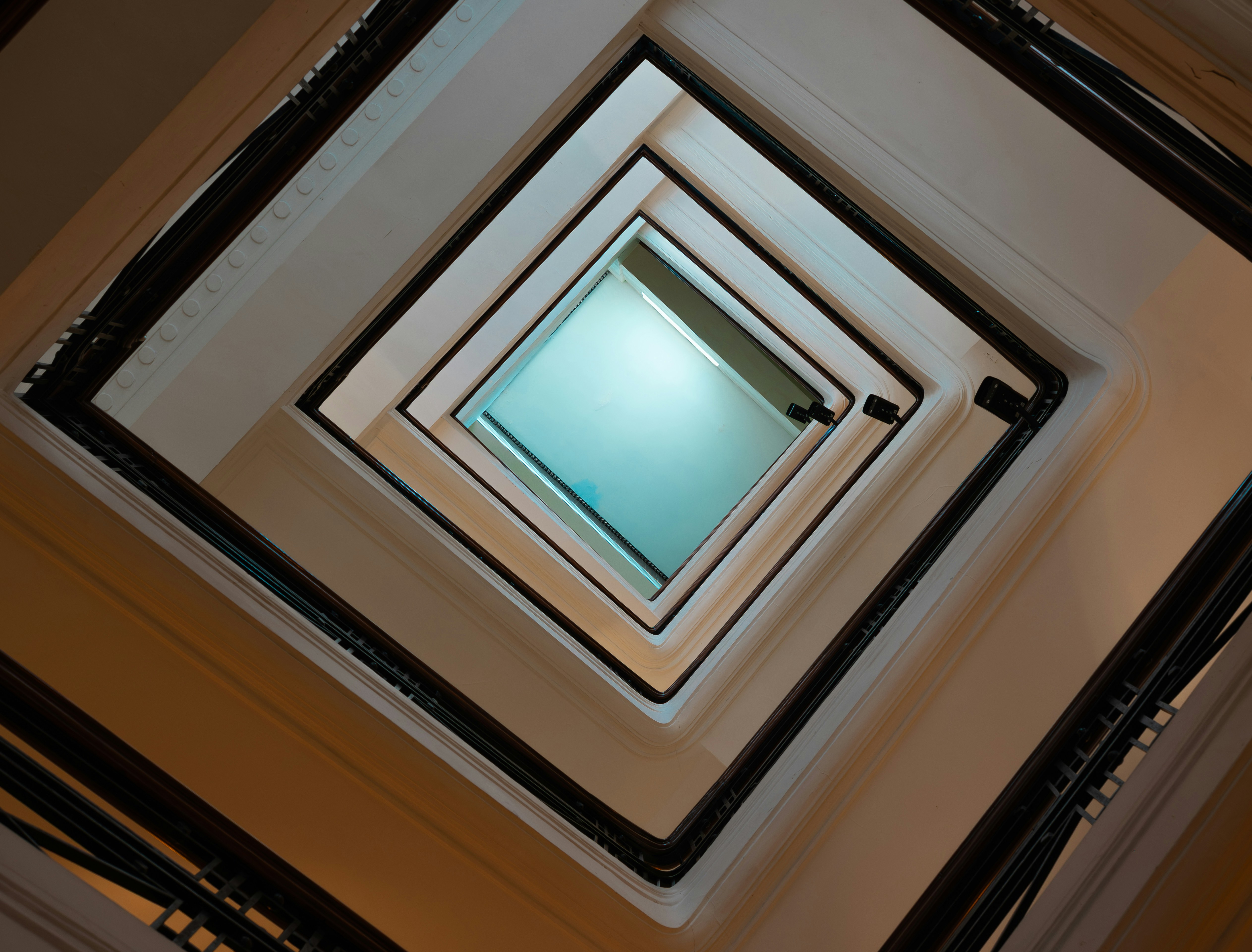 Square Staircase Spiral: A Windowed Descent into Geometric Depth
