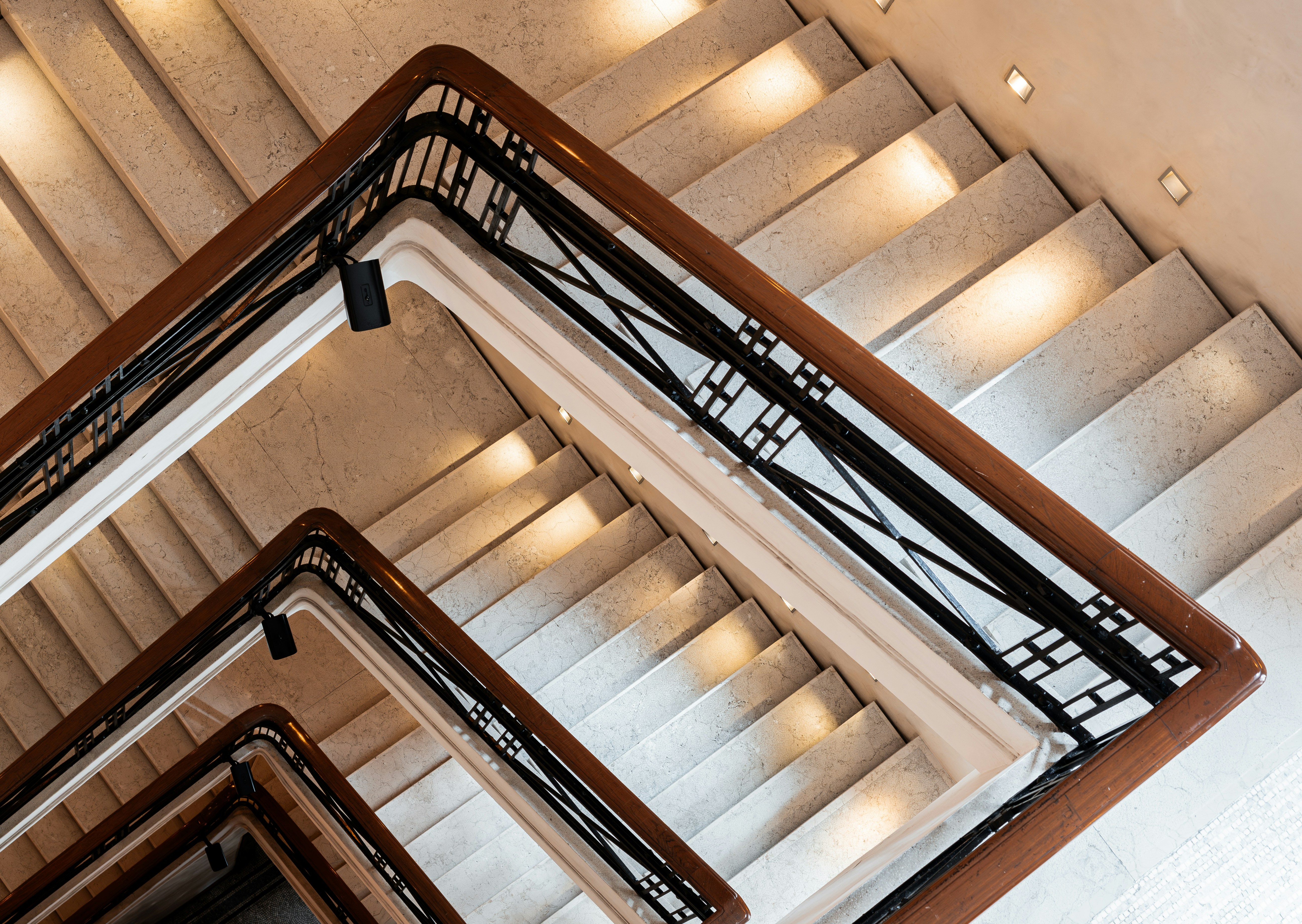 Spiral Staircase: An Upward Journal Through Crosshatch Iron and Warm Wood