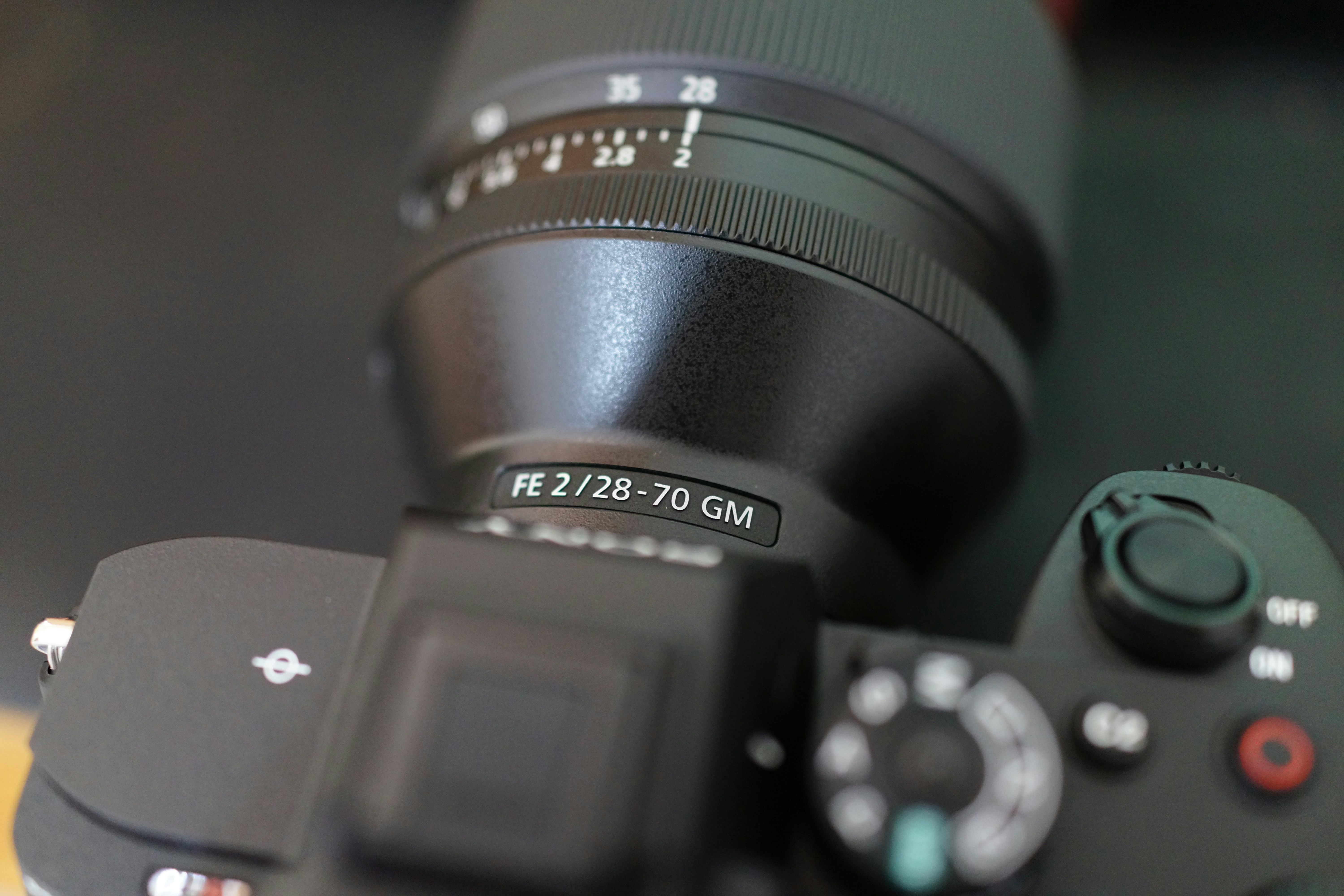 Close-up of a high-end prime lens and camera top plate