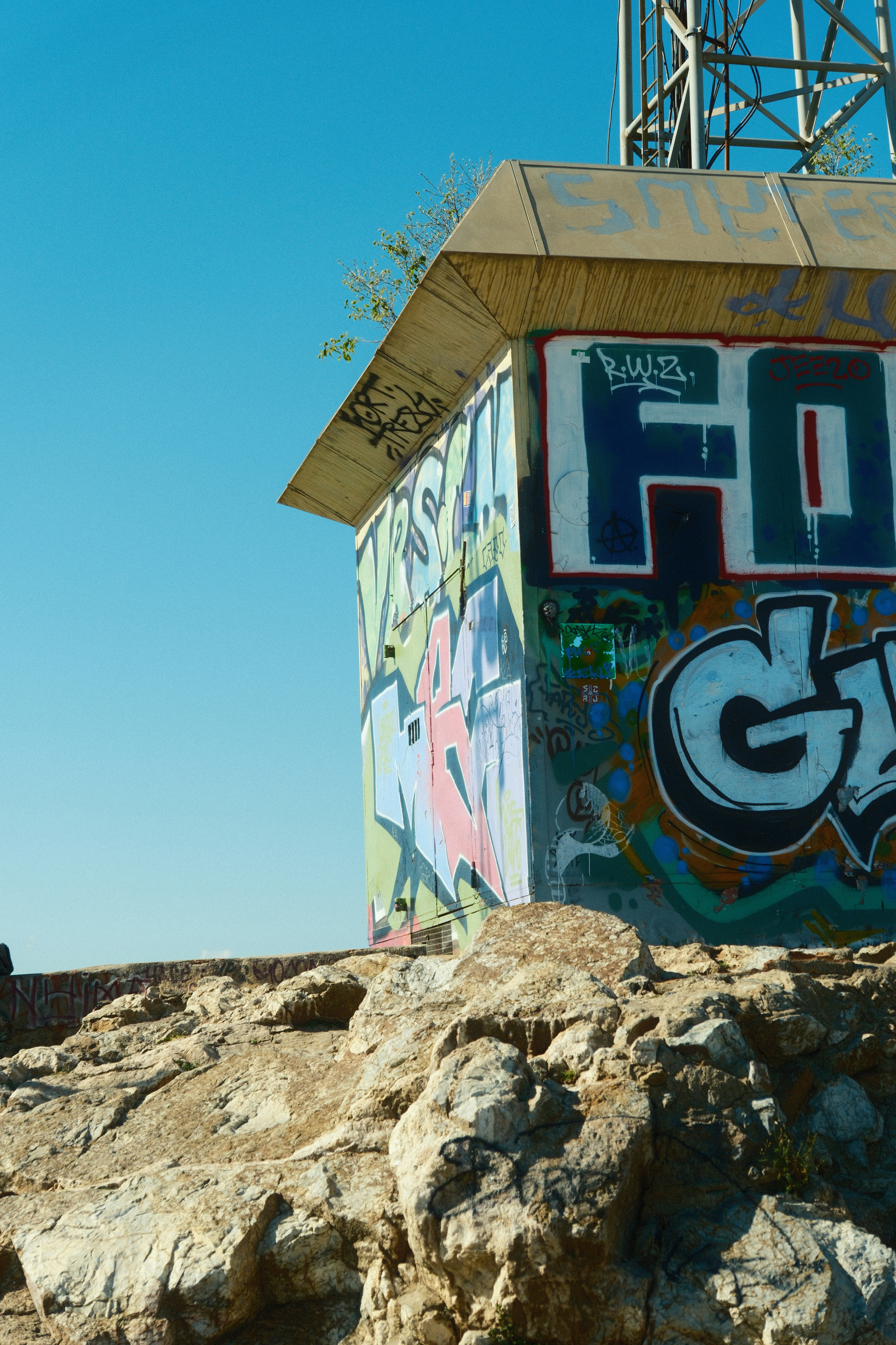 Graffiti Shelter at the Edge: Colors, Concrete, and Sky