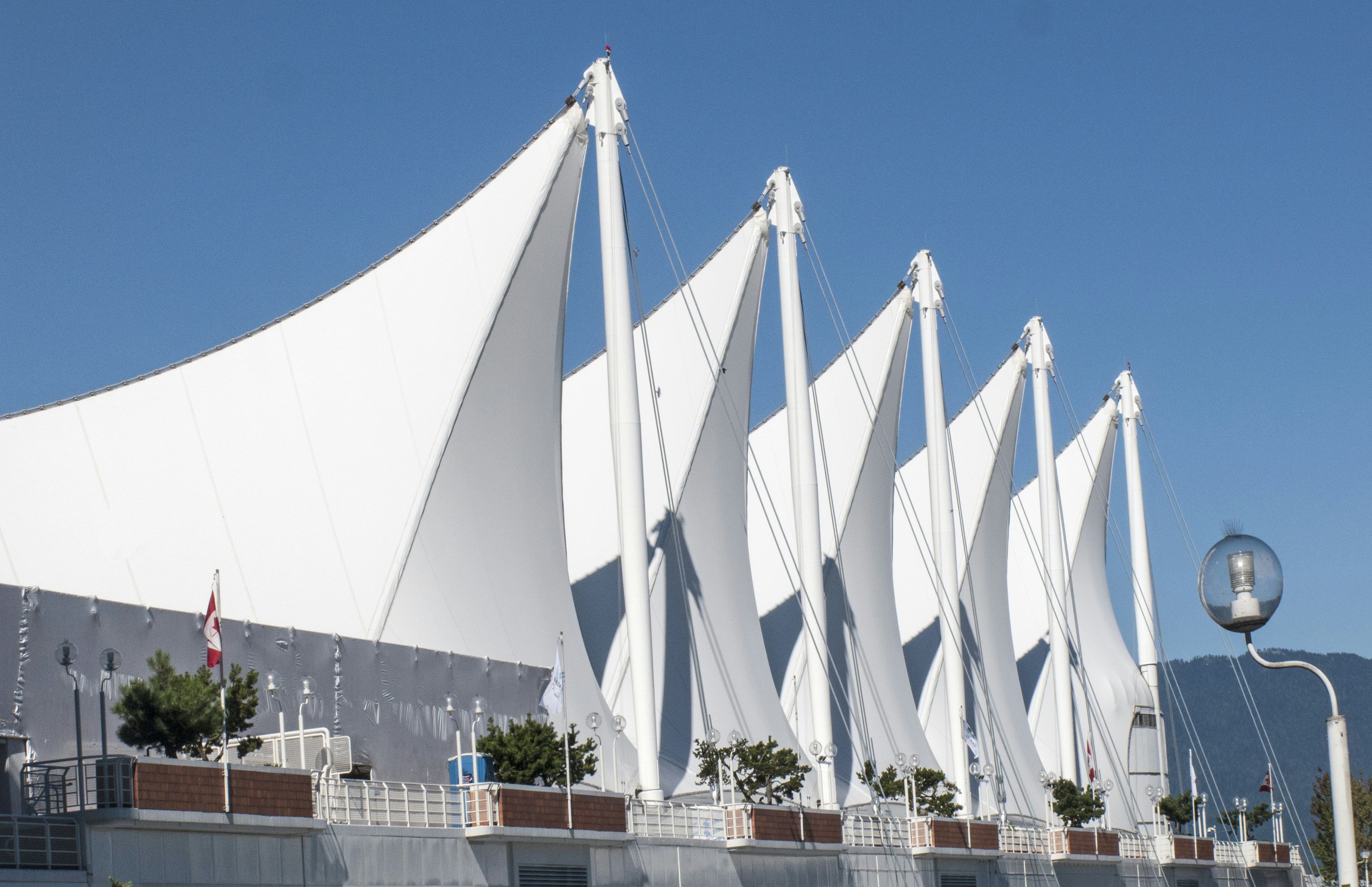 Sailcloth Peaks: A Row of Tented Spires Against a Clear Blue Sky