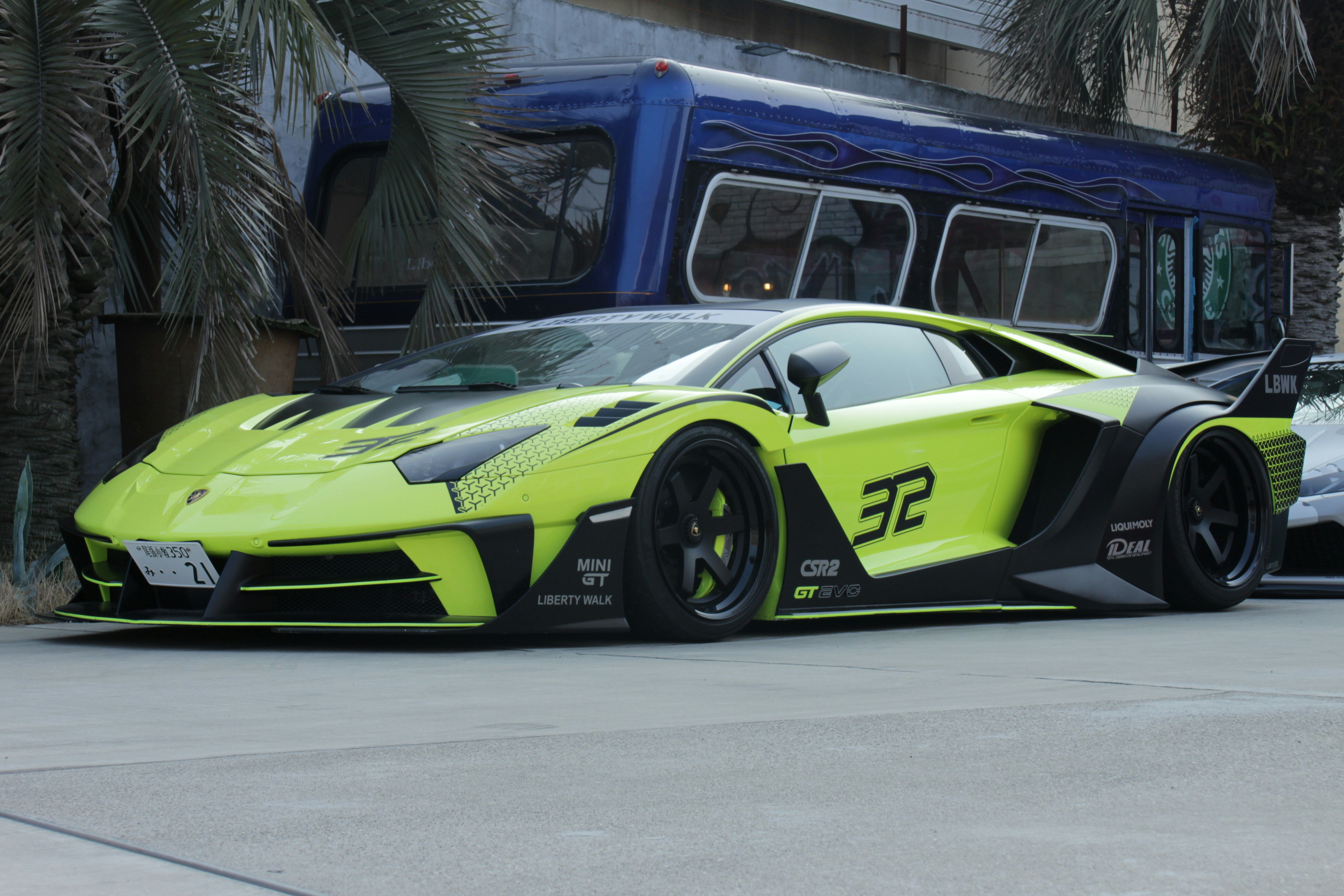 Lime Velocity: a neon-green supercar beside a blue tour bus