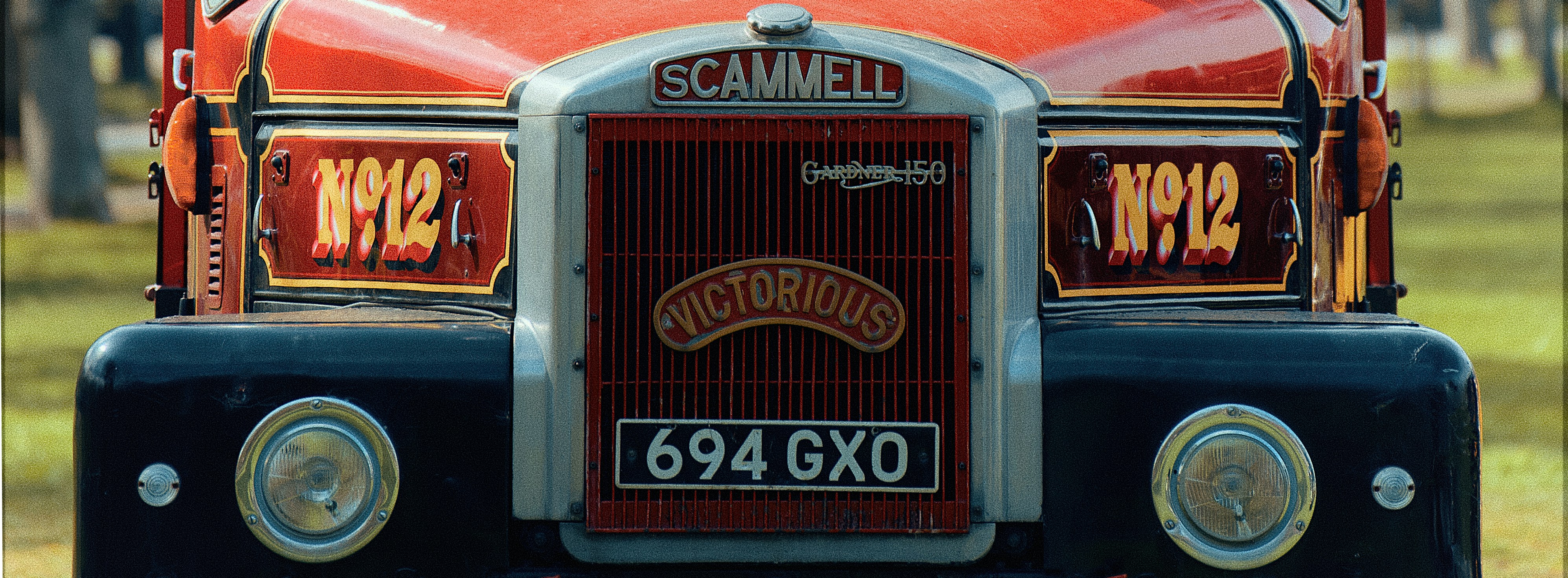 Grinning Grille: a vintage truck’s chrome kiss and bold badge