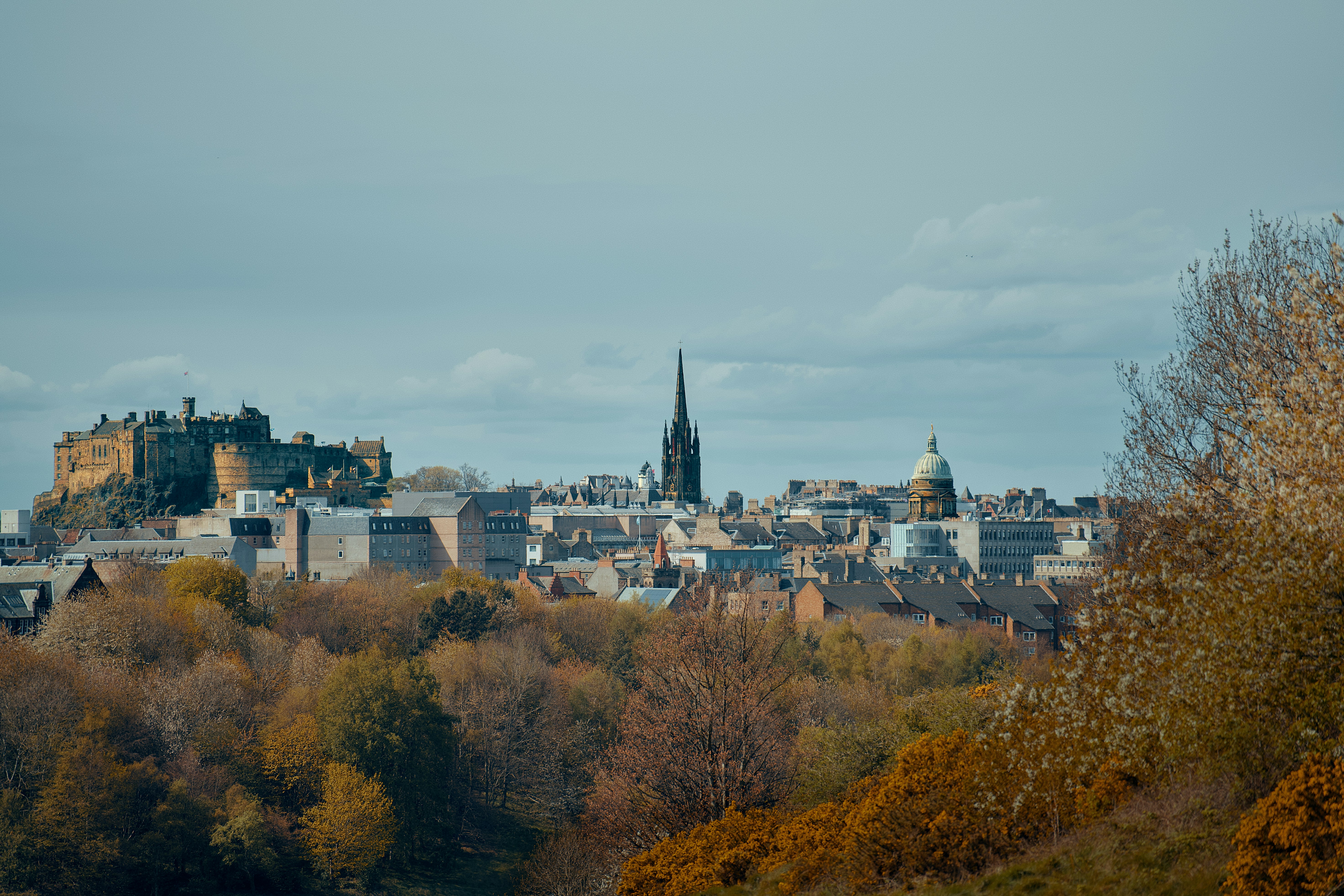 Autumn Skyline: Historic City with Dominant Cathedral Spire