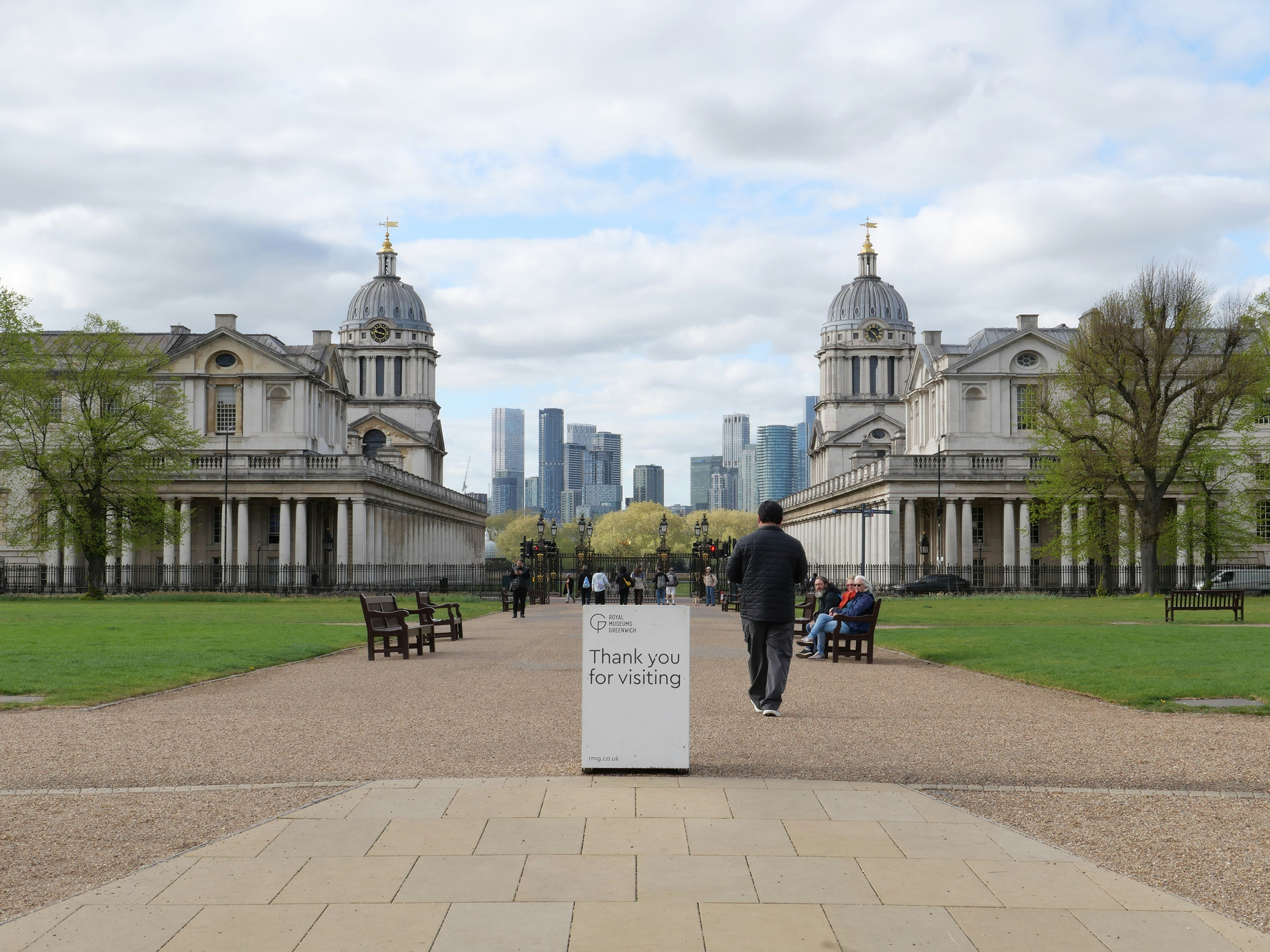 Majestic Twin Pavilions Framing a City Park Path