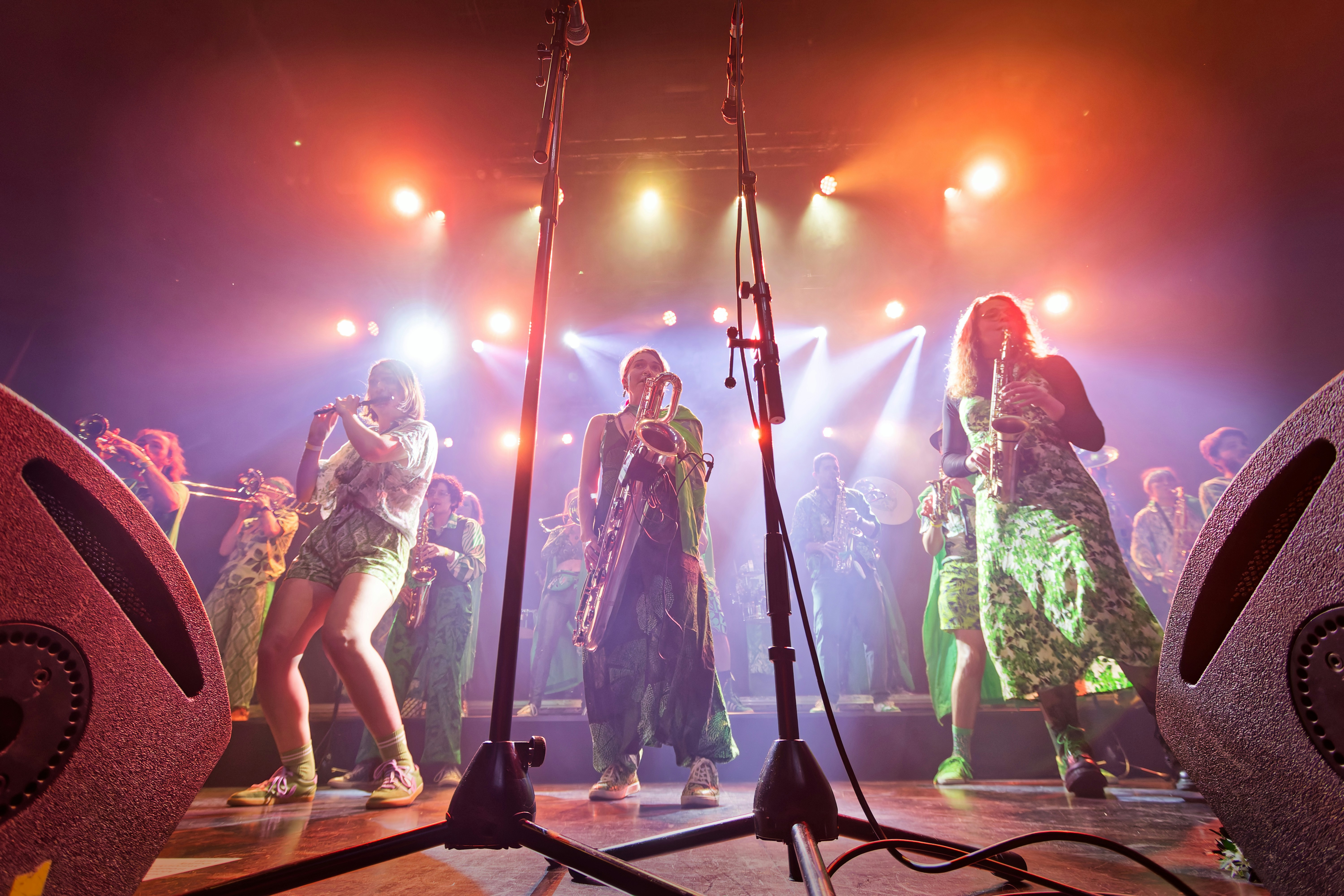 Stage Awakening: A Brass Section Surges Under Neon Fog