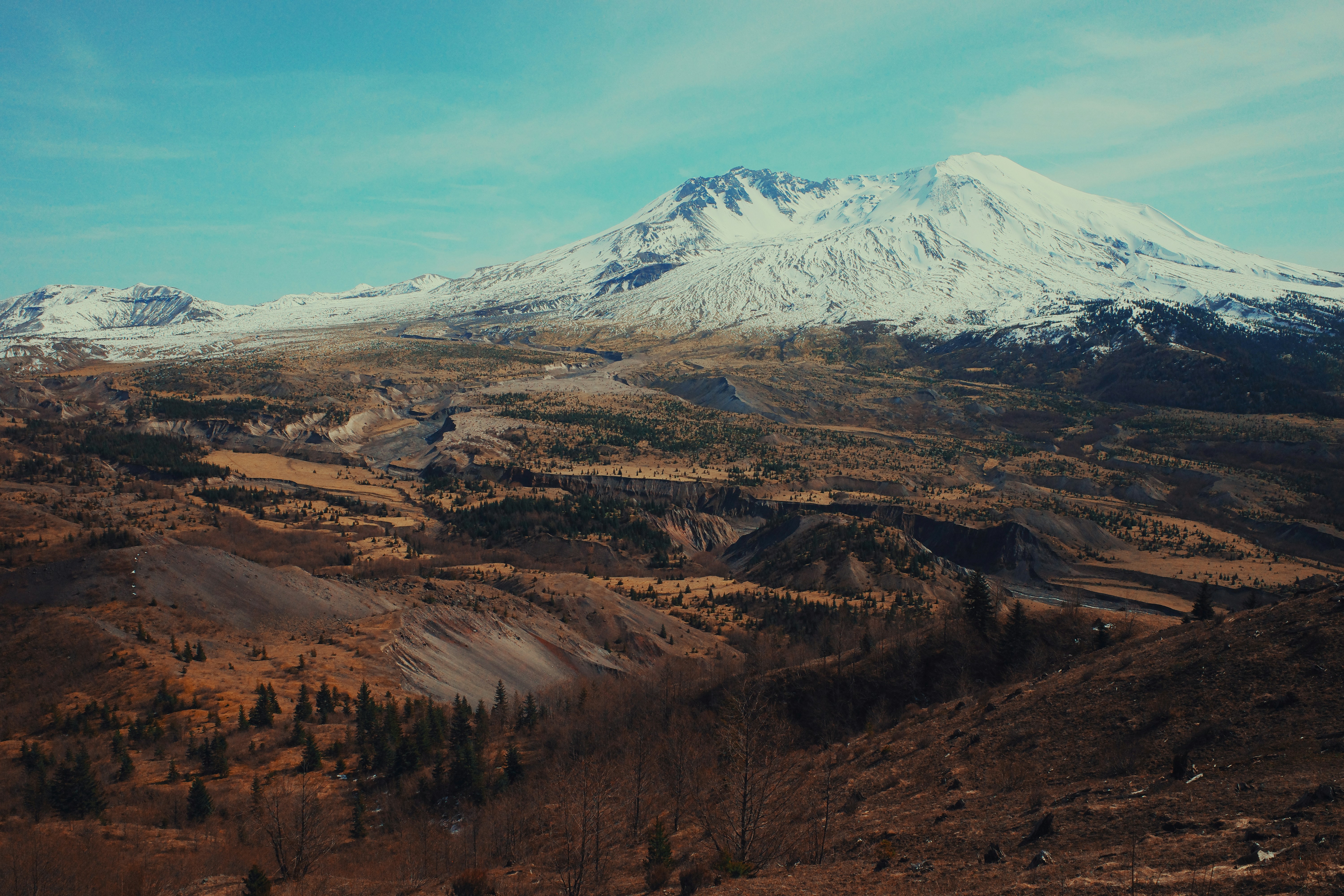 Snowbound Peak Over Golden Valleys