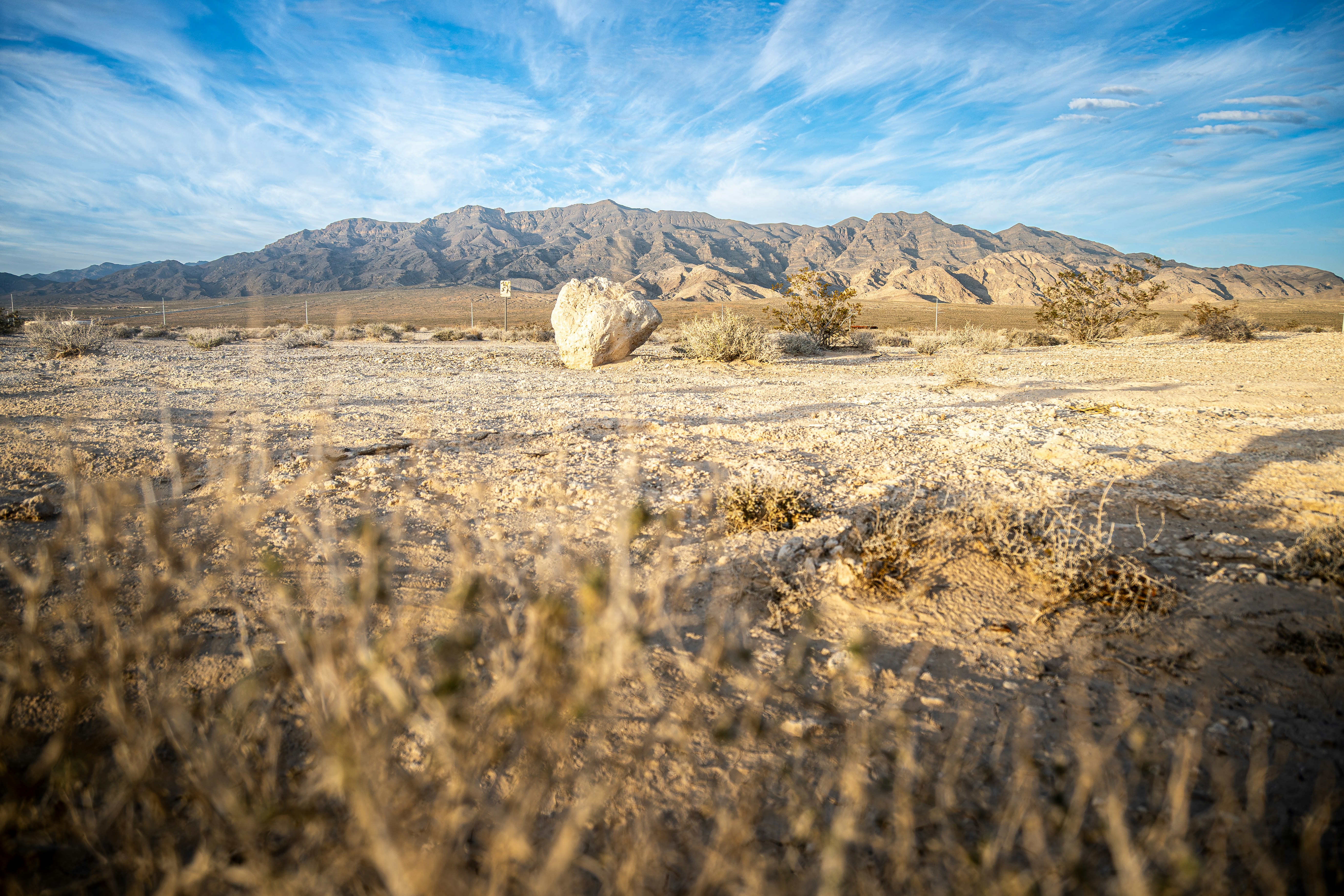 Desert Remnant: A Lone Boulder Guarding the Mesa