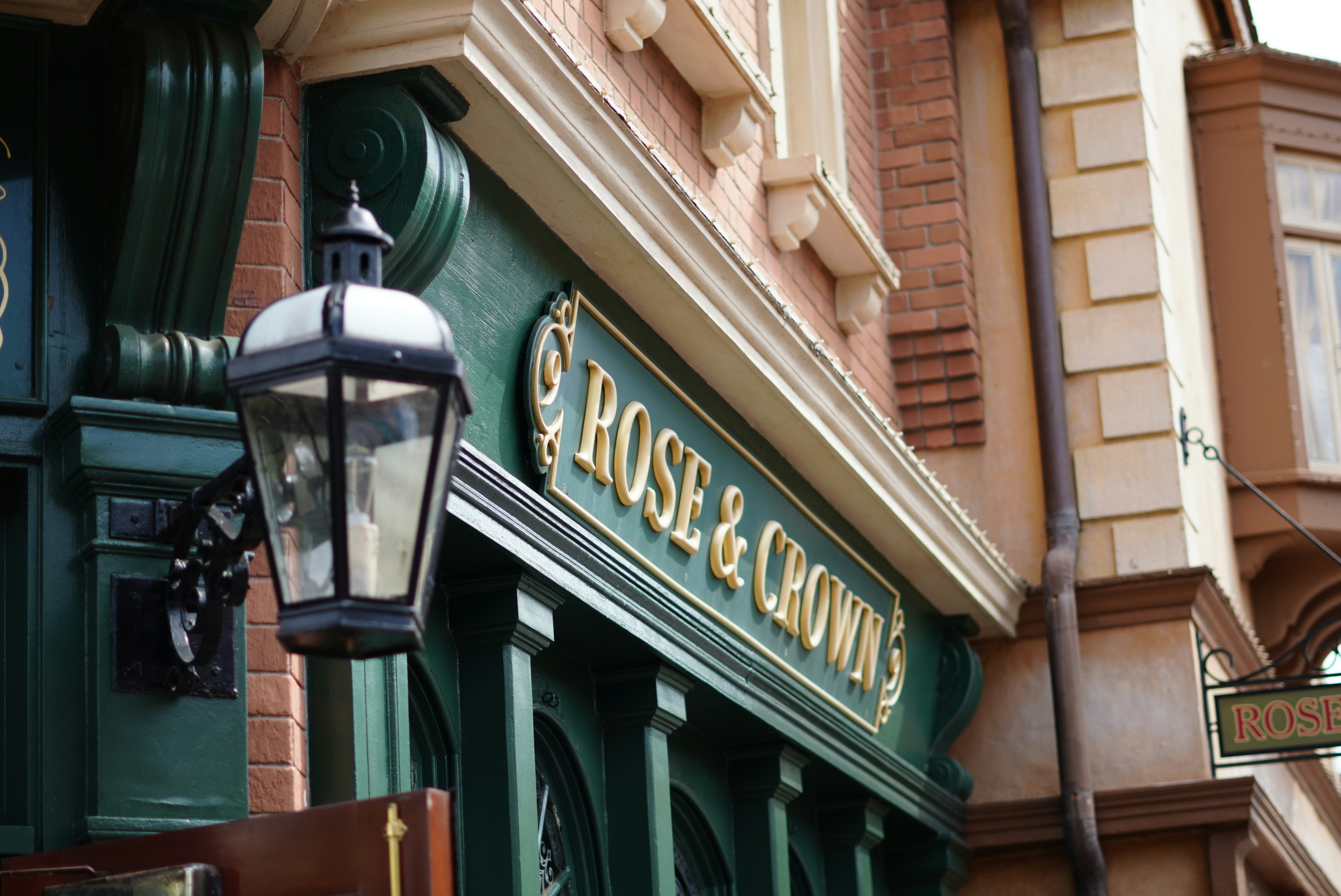 Rose & Crowns: A Charming Corner Storefront with Vintage Lantern