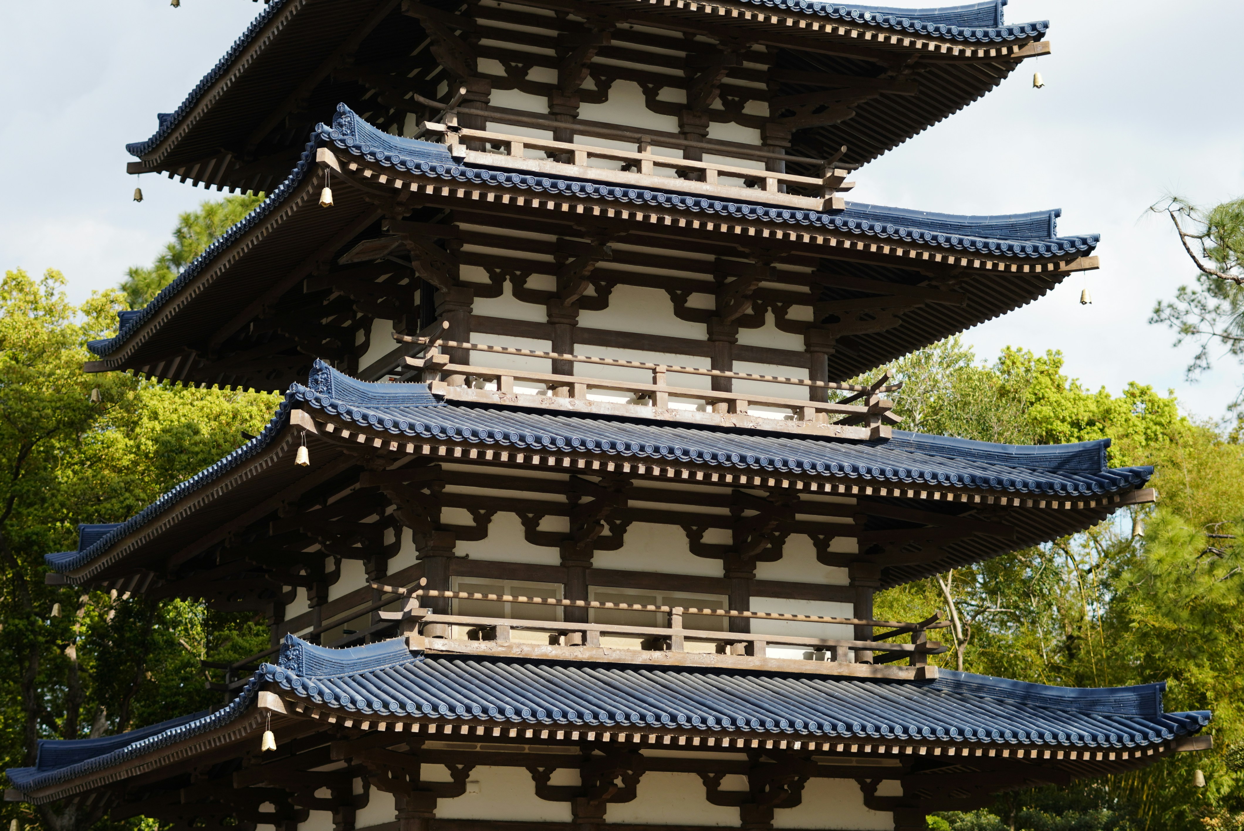 Seven-Tiered Pagoda Rising Above Green Canopy
