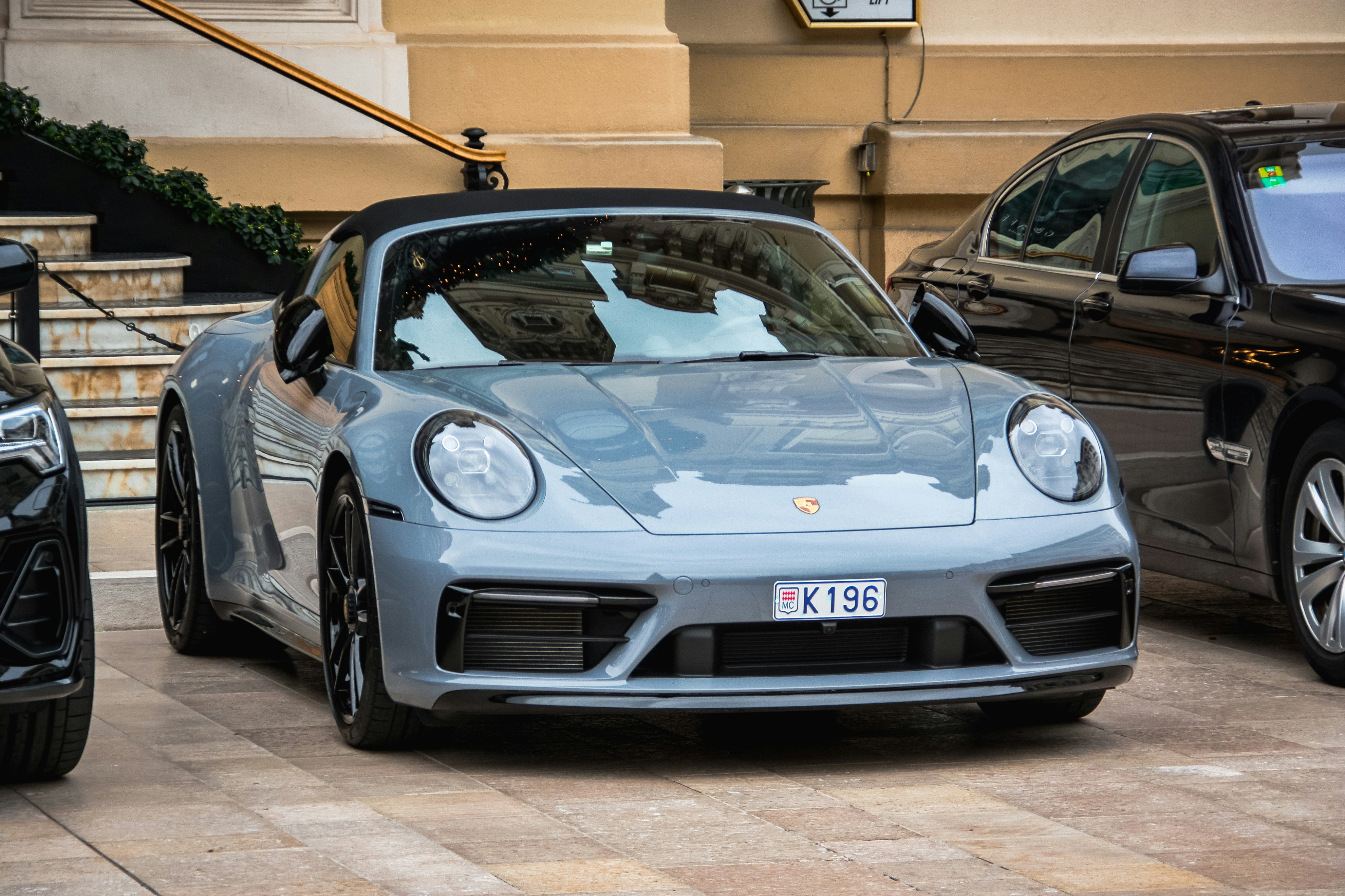 Blue Porsche Paired with Street-side Luxury