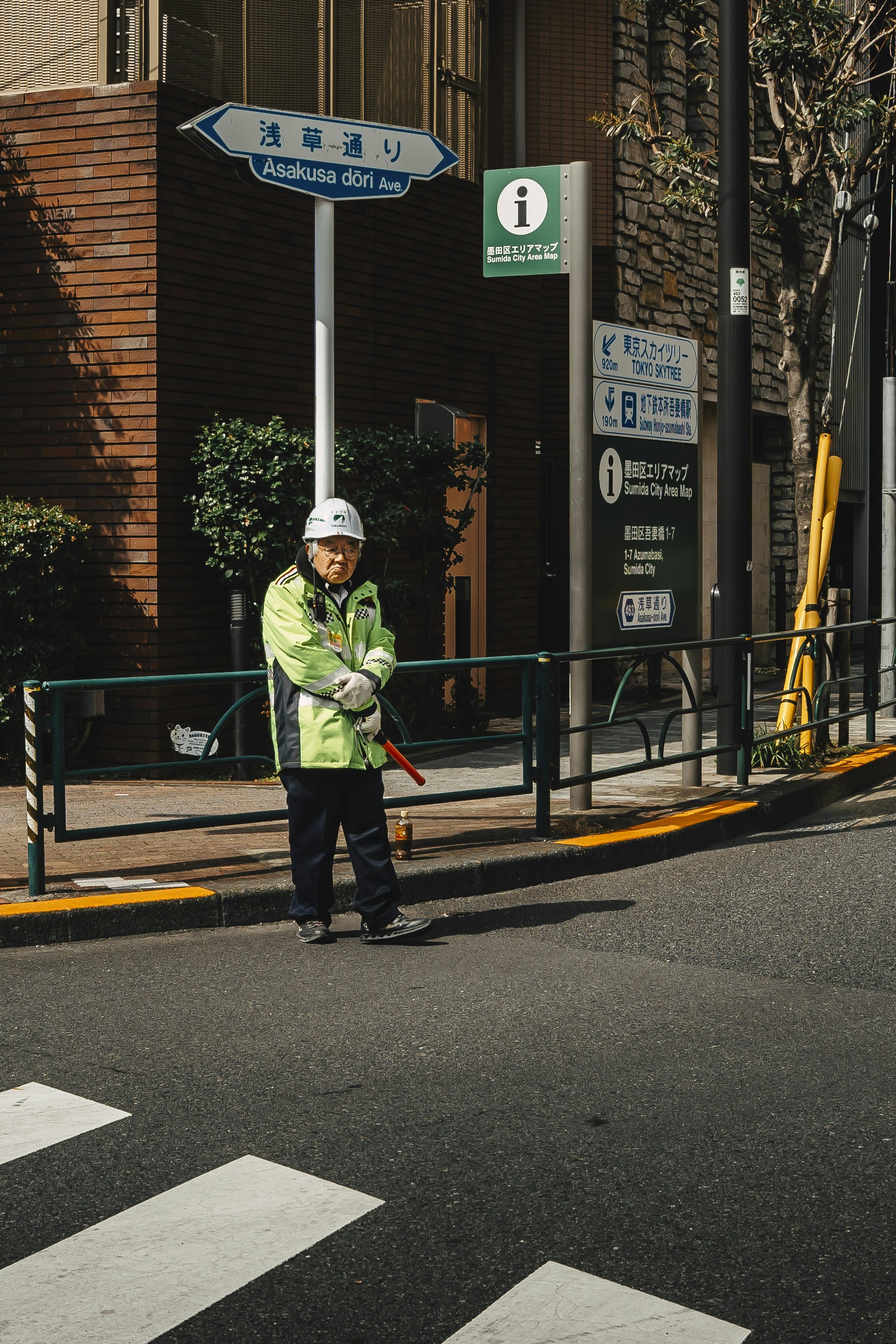 Crosswalk Keeper: A Street Station Theatrically Painted in Neon Signals