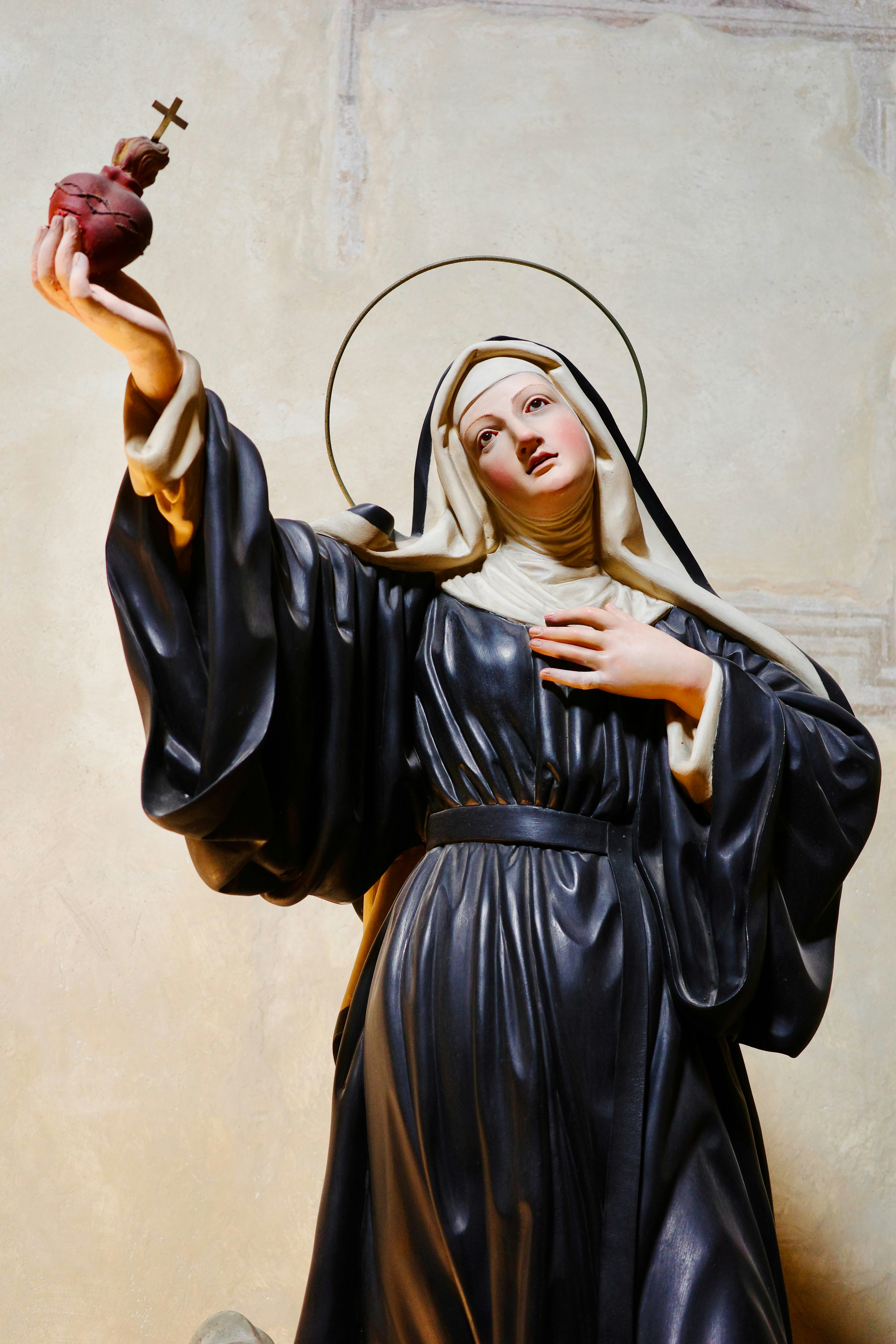 Haloed Offering: A Saintly Gesture Lifted Toward the Light