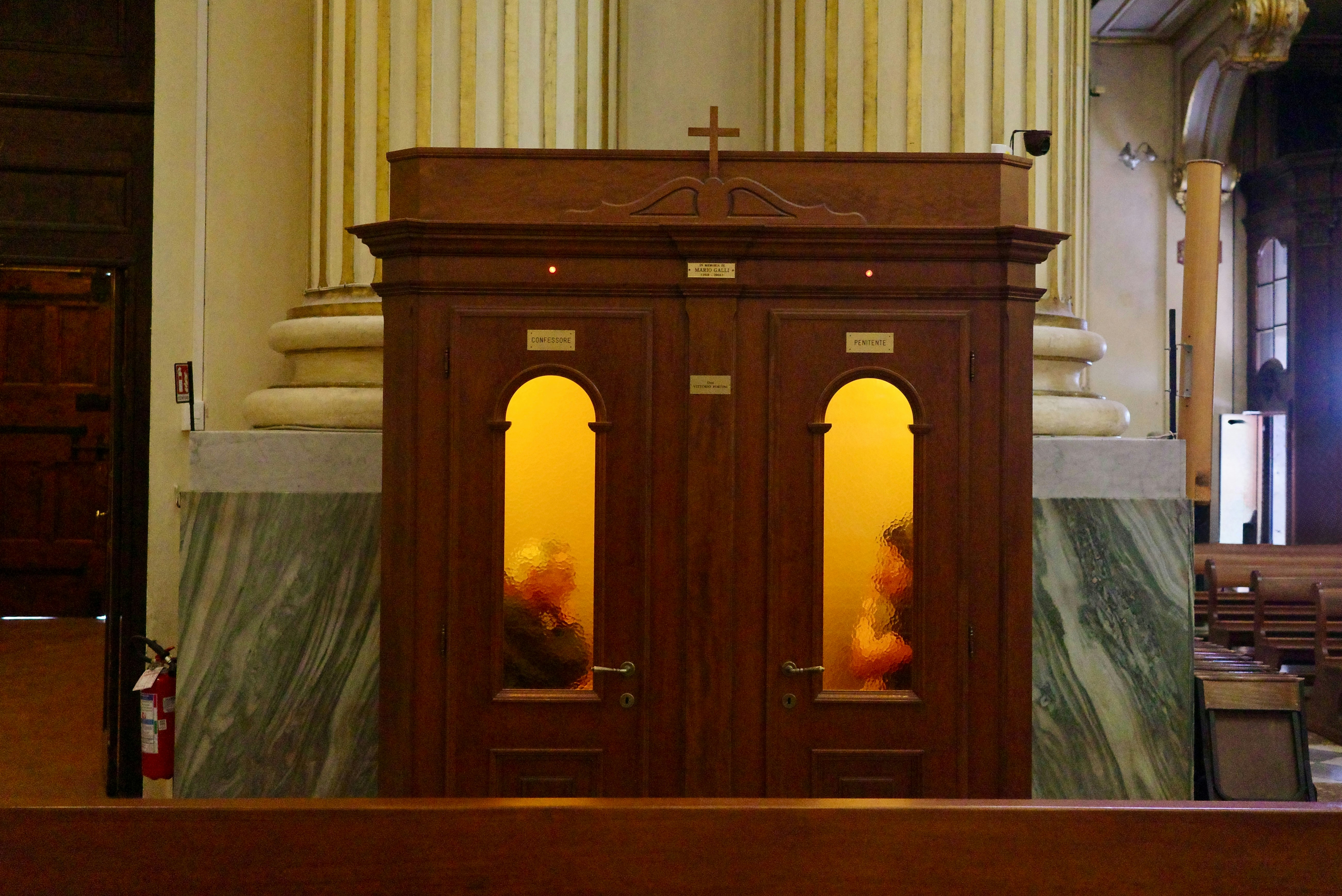 Saintly Booths at Dusk: A Quiet Chapel Centerpiece