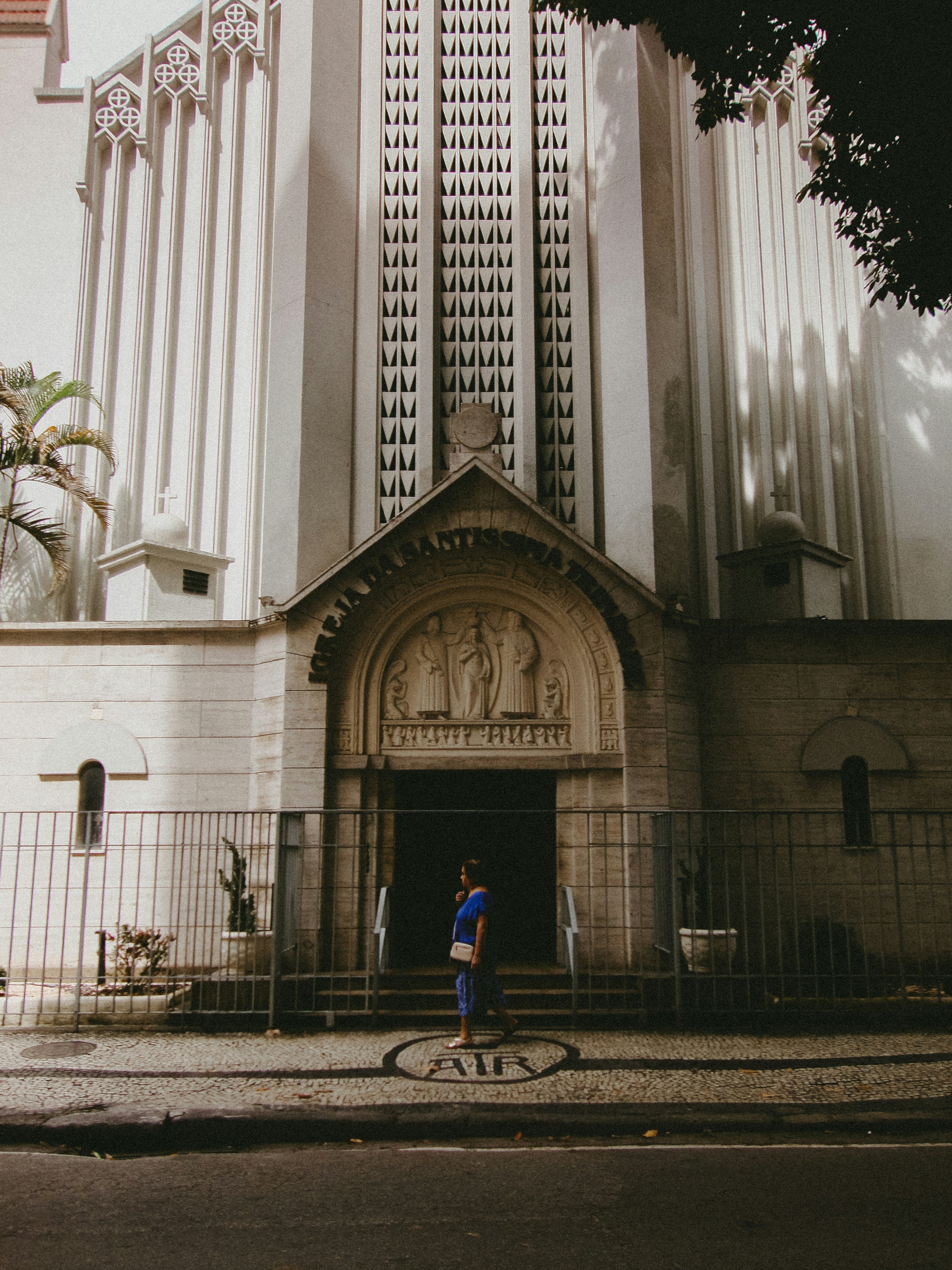 Footsteps to the Portal: A Lone Figure Before the Cathedral Facade