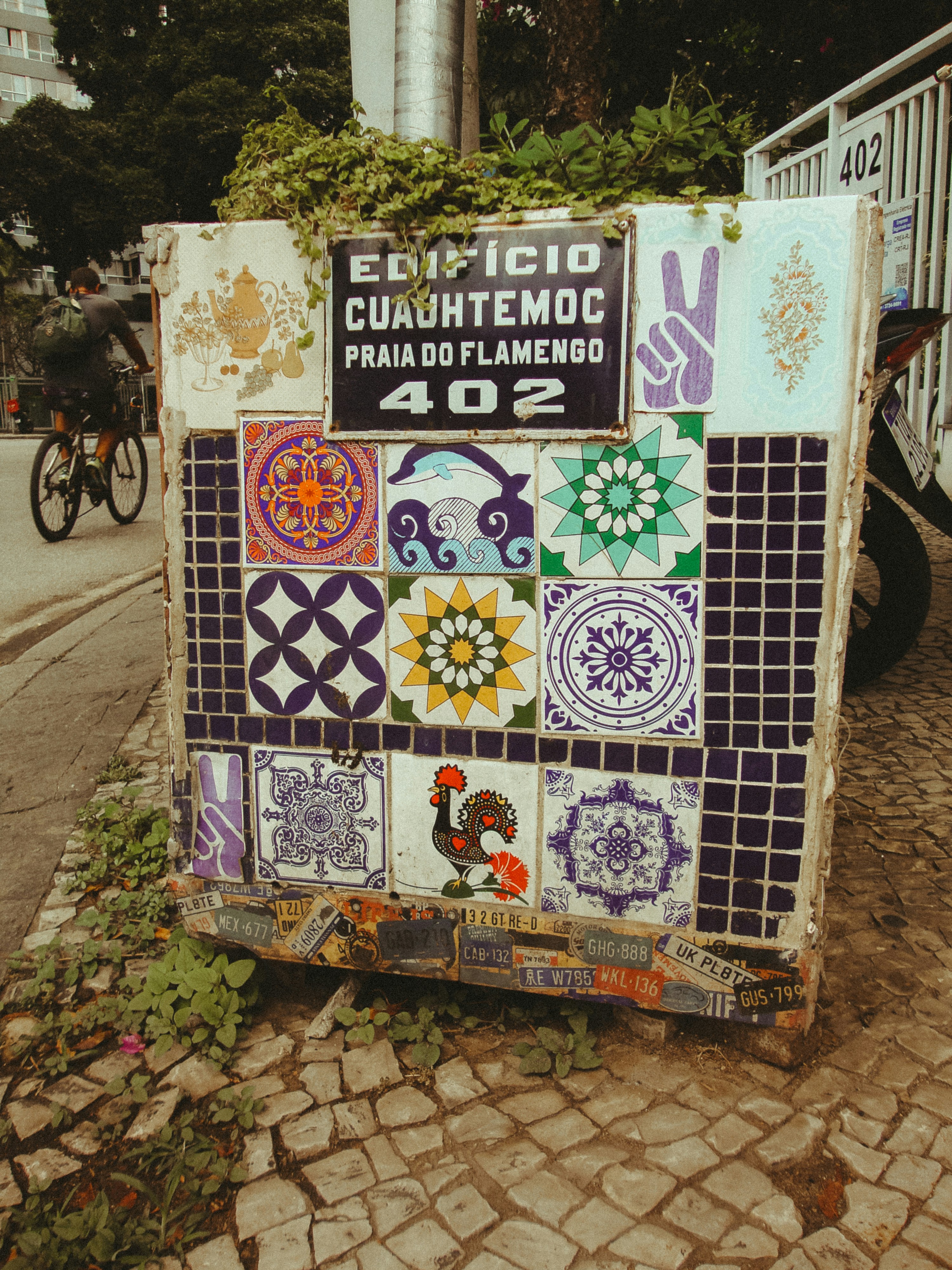 Tile Mosaic Toll Booth on a Cobblestone Street