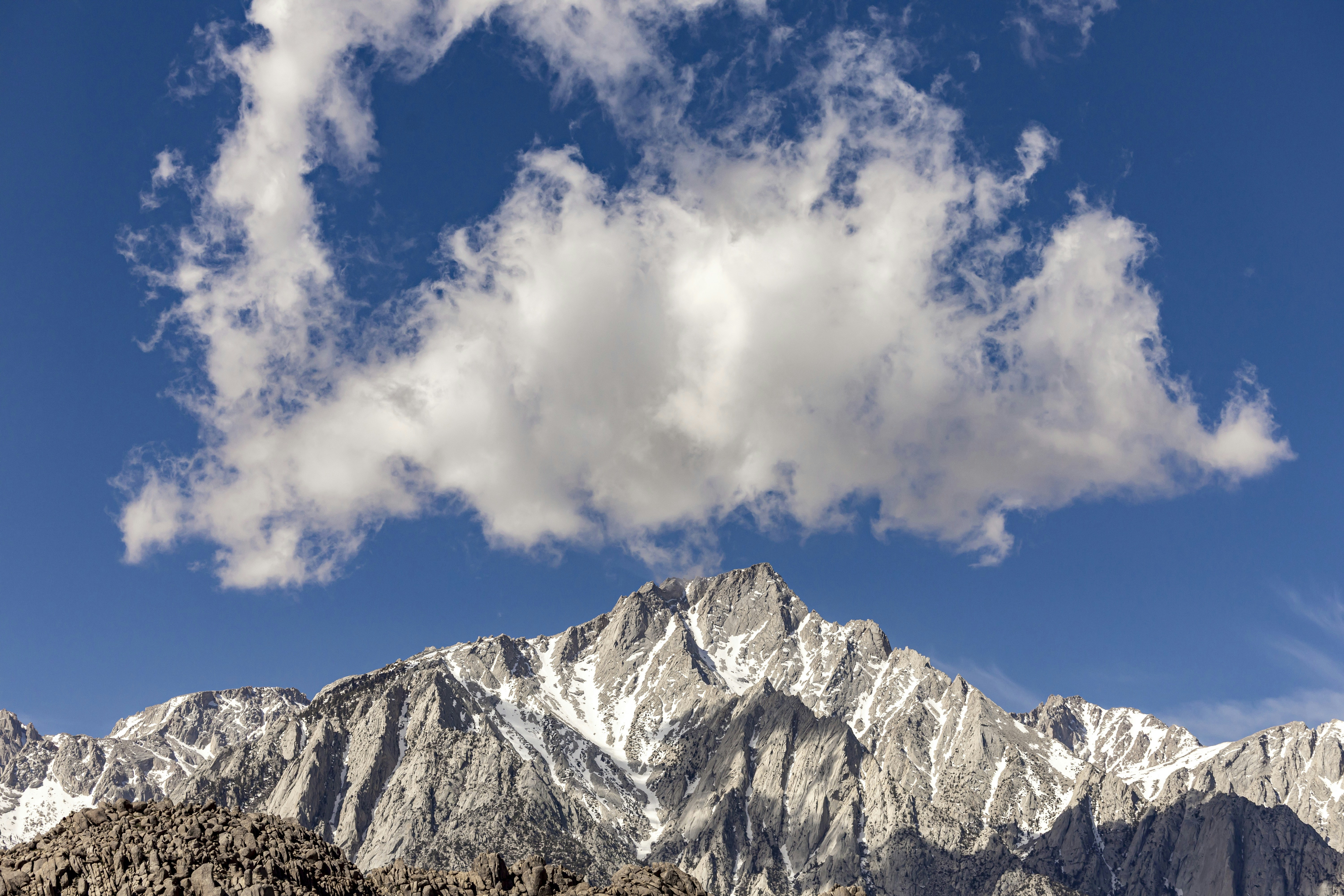 Cloud Crown Above Snowy Peaks