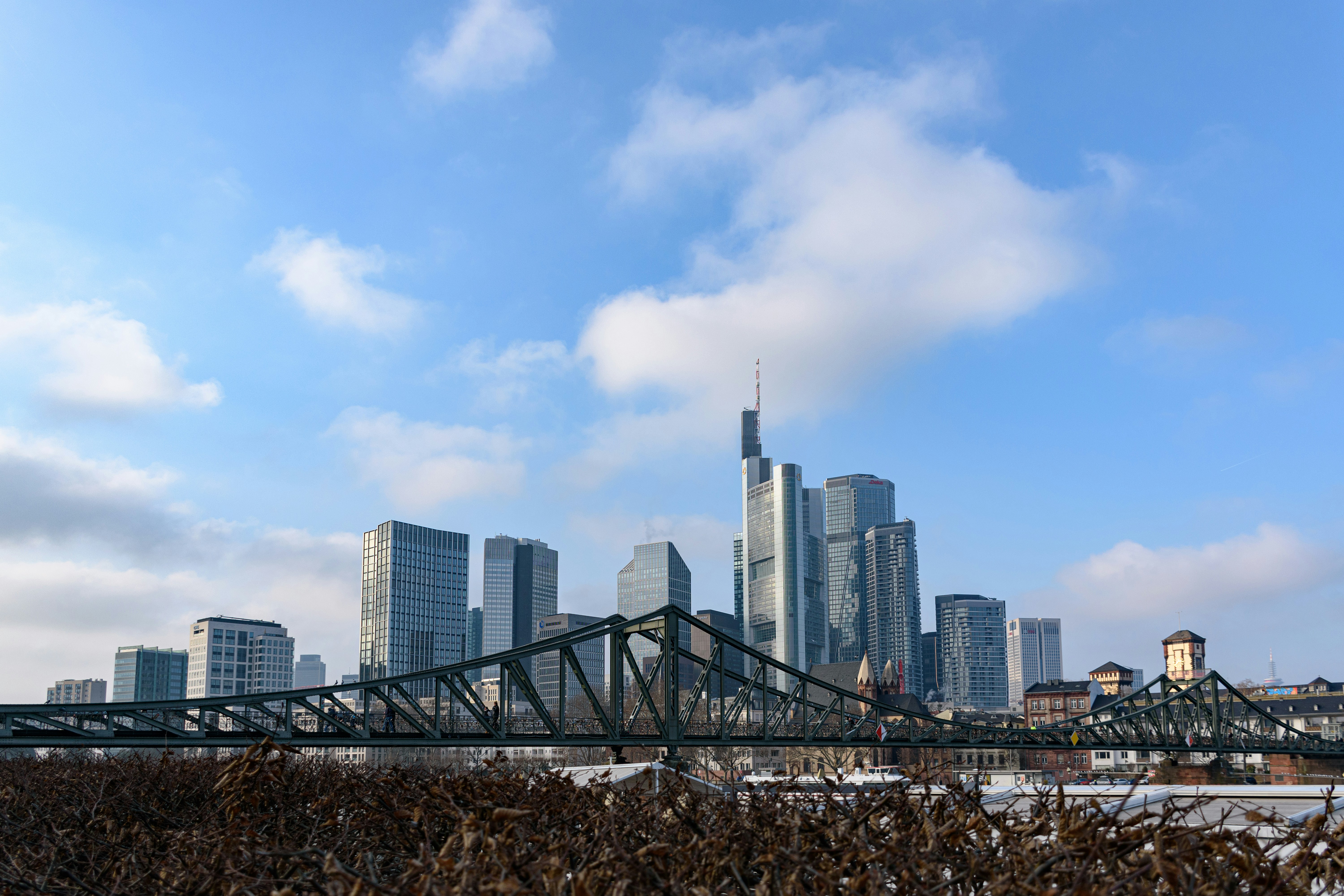 Rising Cityscape Over the Iron Bridge