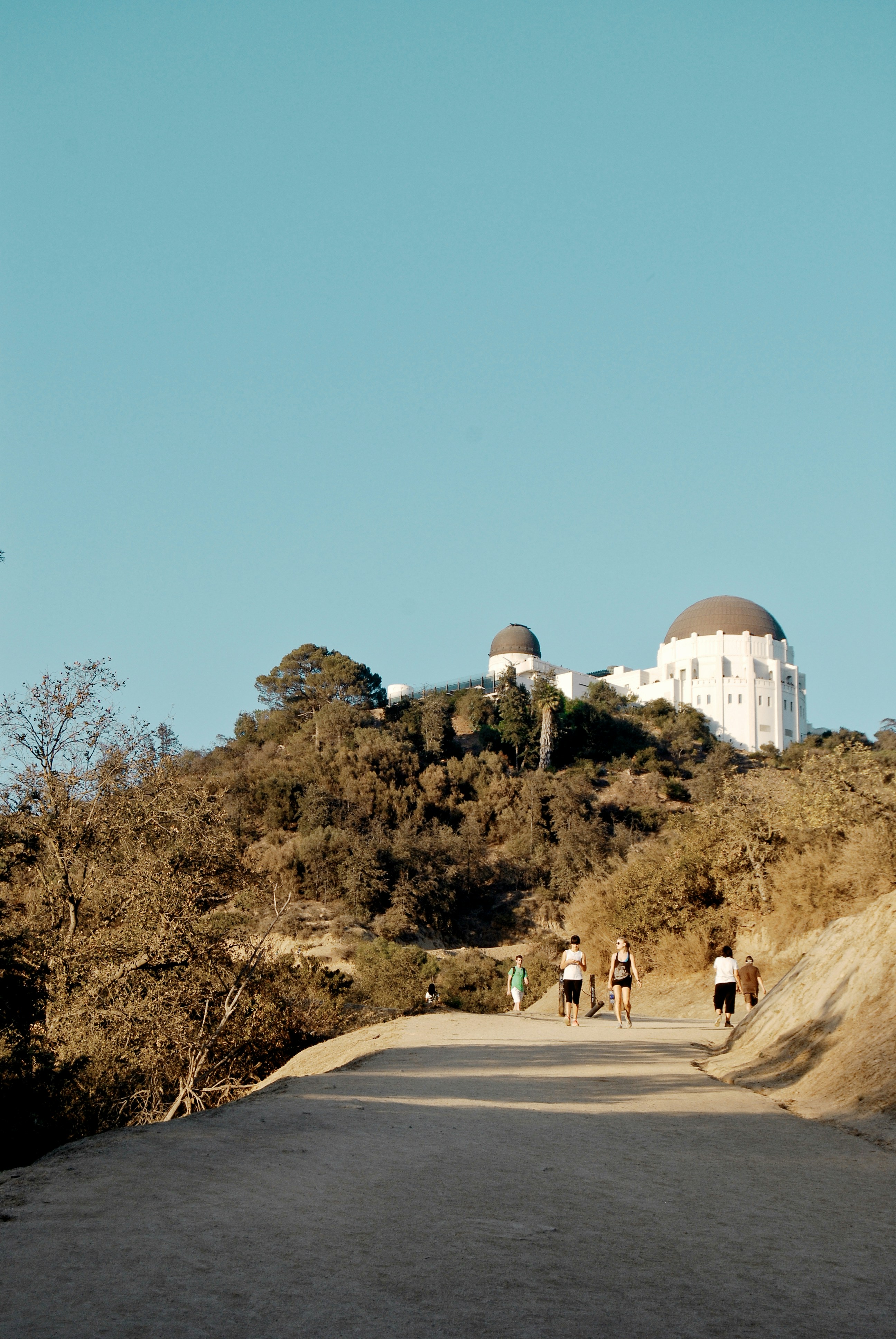 Path to the Observatory: Hikers Ascend a Sunset Trail