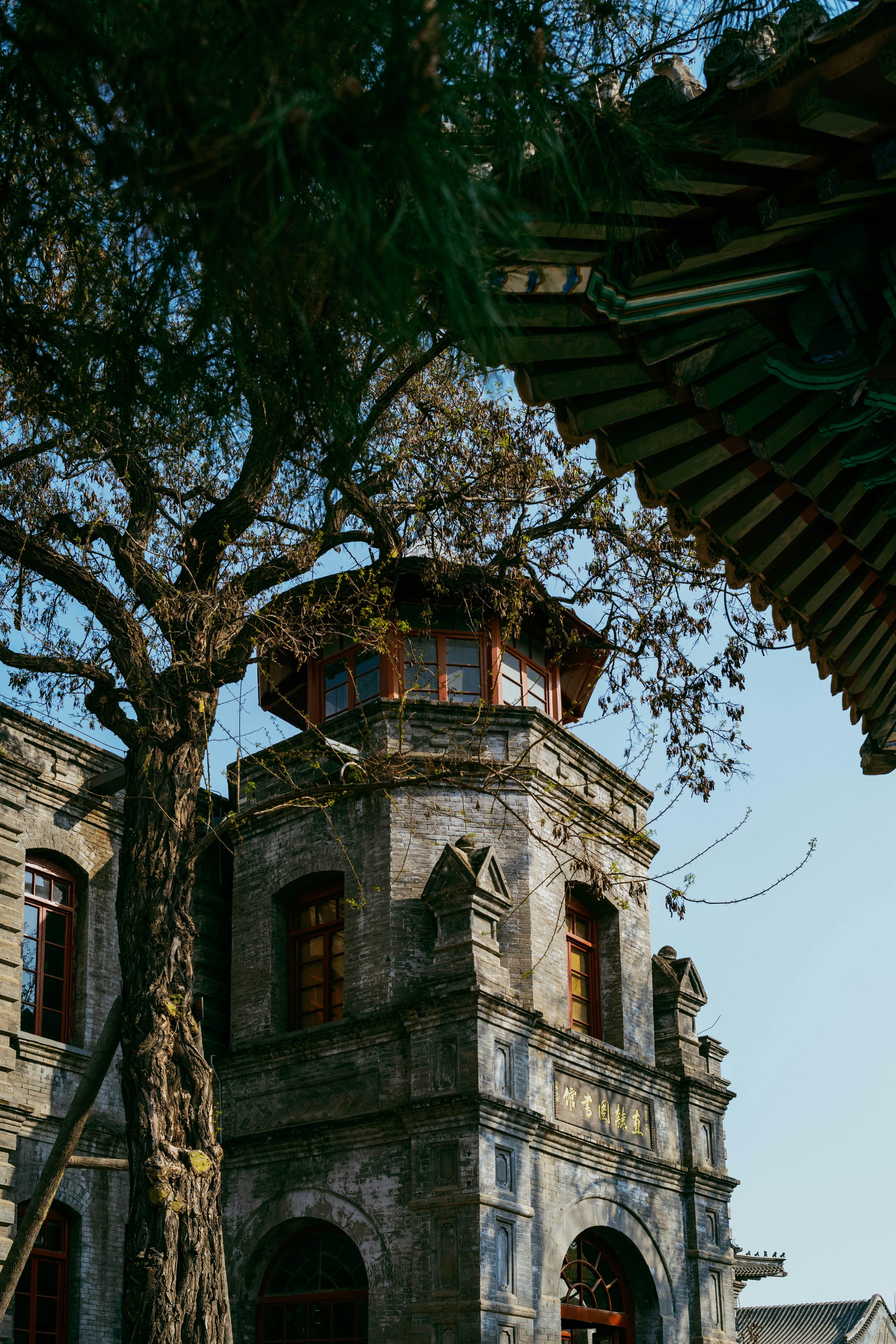 Ancient Gatehouse Beneath an Overhanging Roof in a Chinese Courtyard