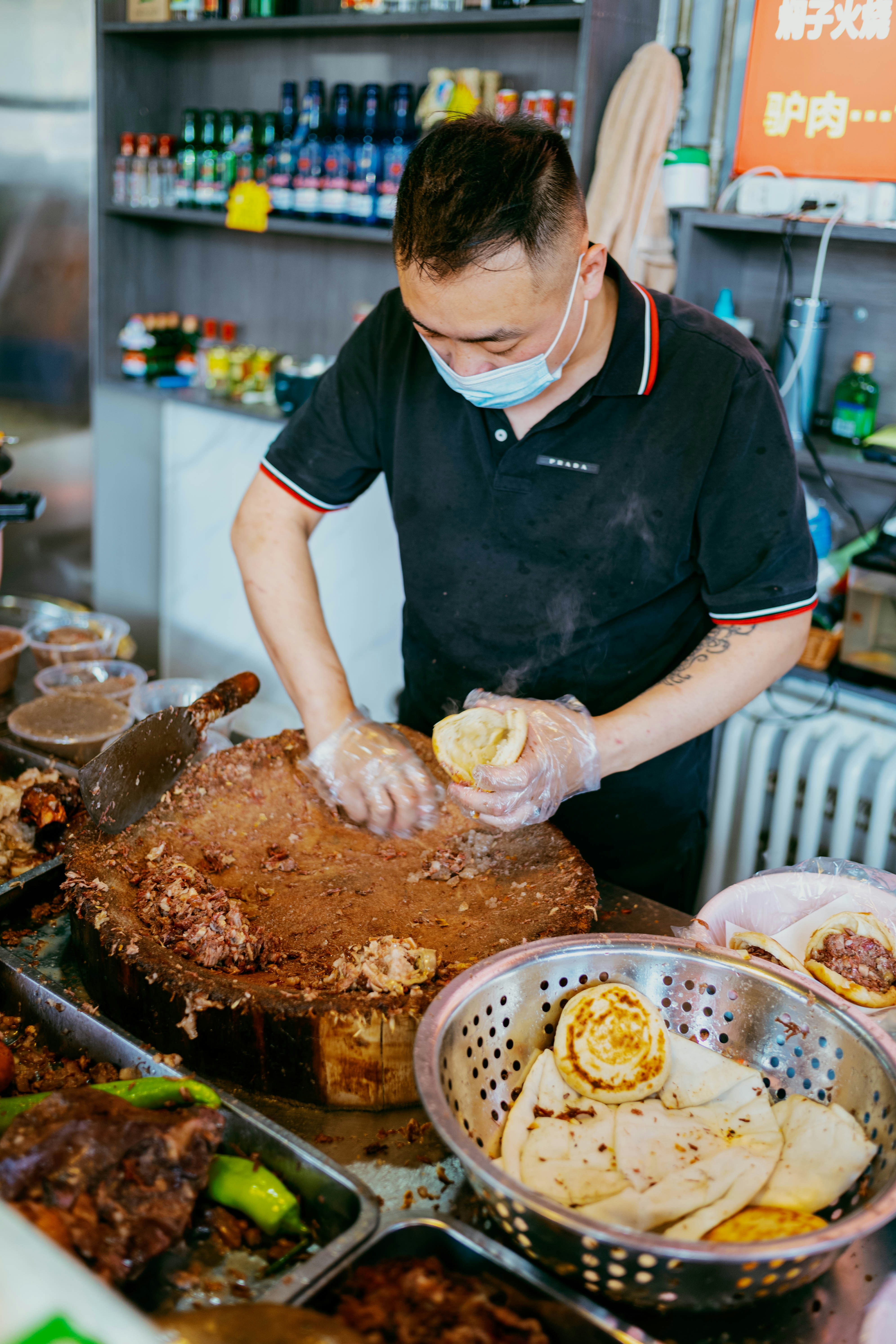 Butcher’s Craft: Hands Shaping Tender Dosa in a Busy stall
