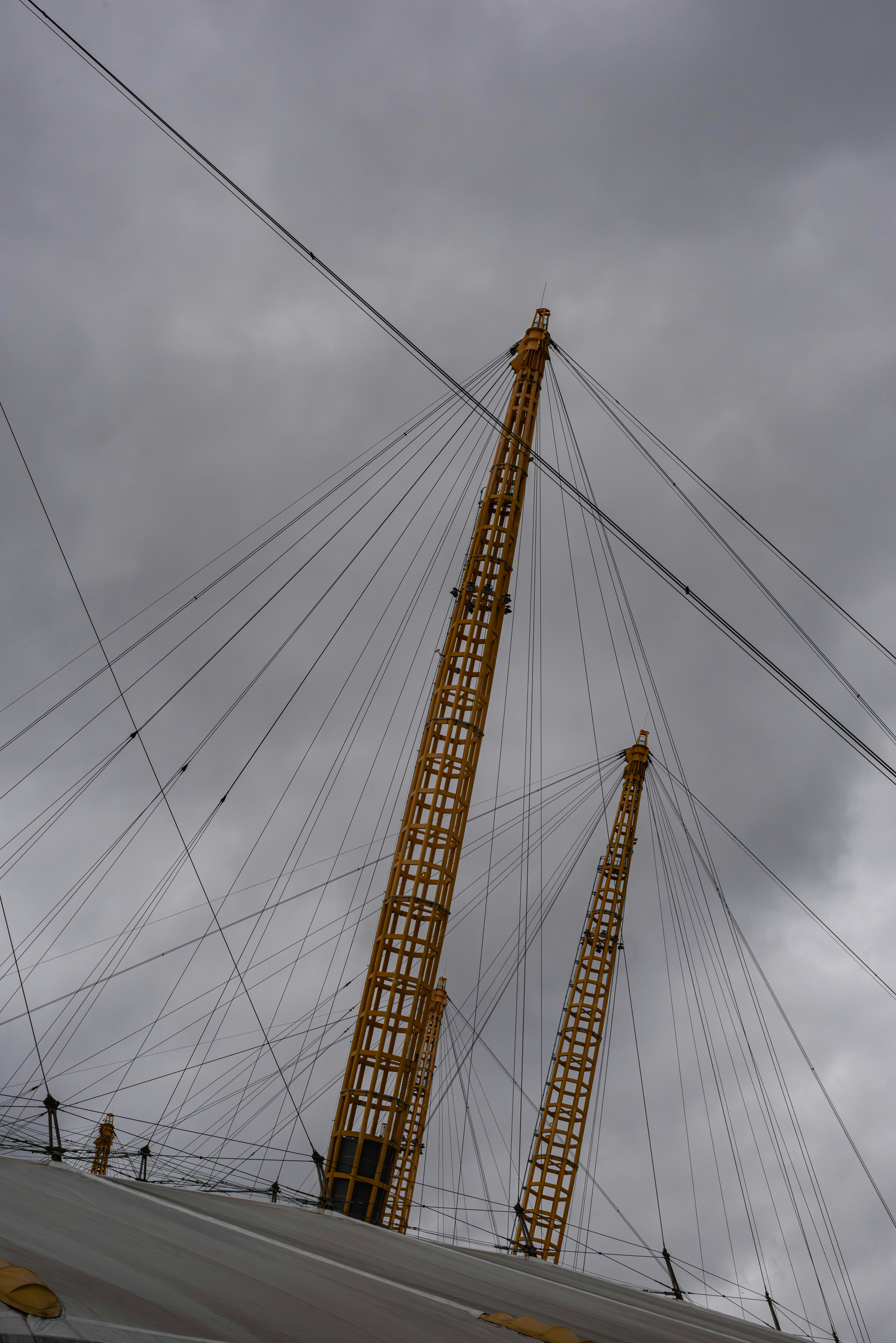 Crane Towers Reaching into a Stormy Sky