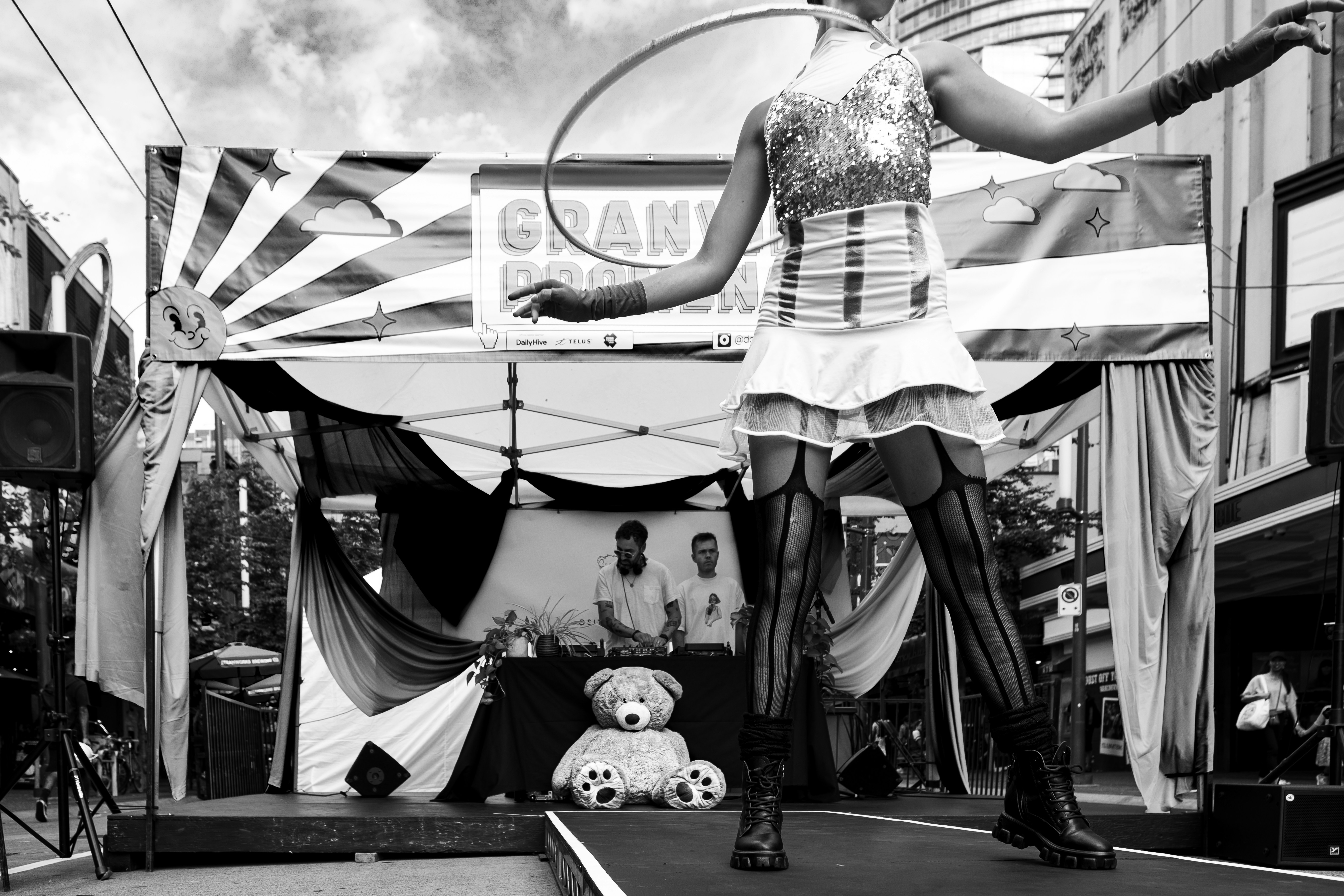 Center Stage of the Strip: A Dancer Soars Over a Carnival Runway