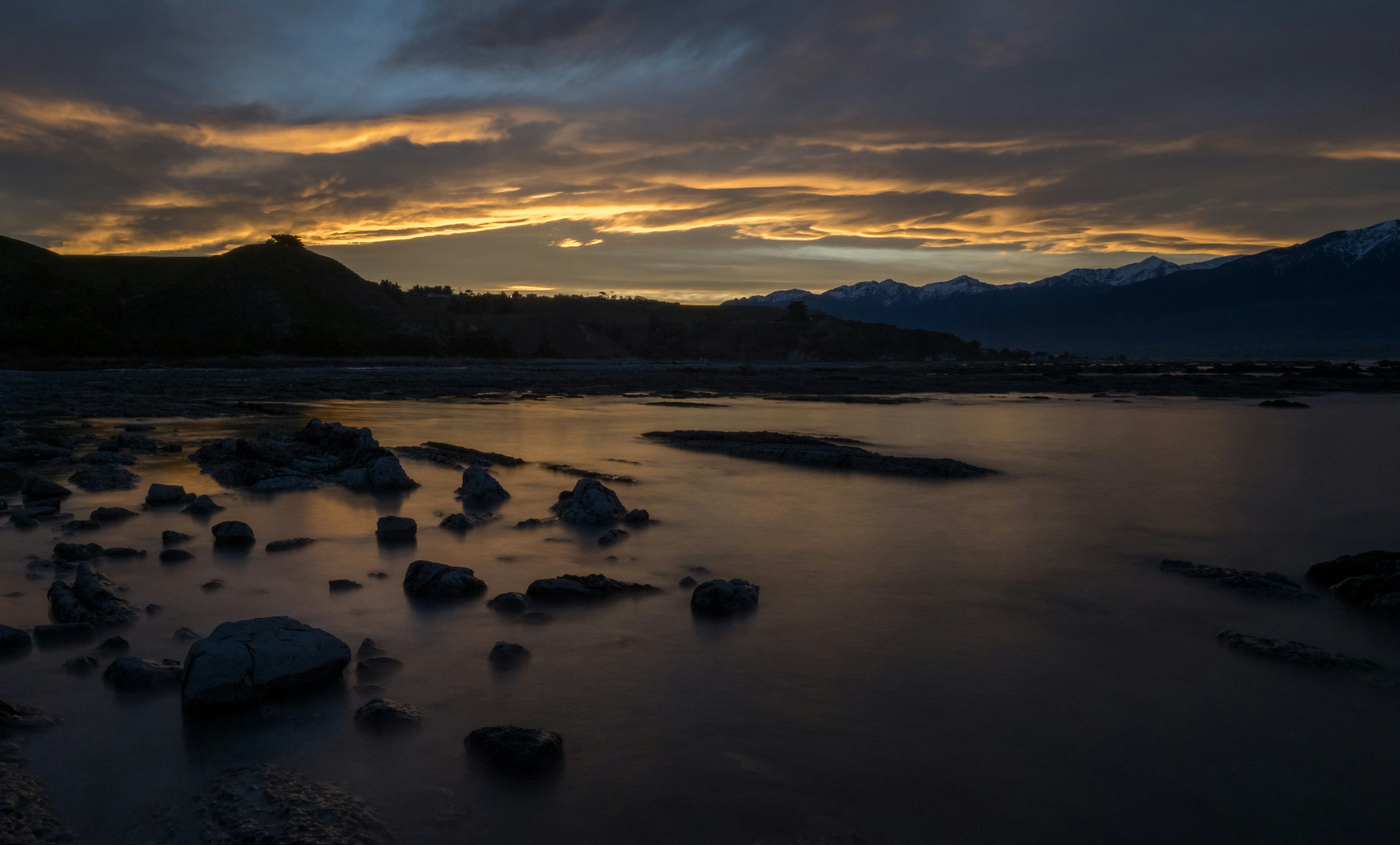 Dusk Crest Over Quiet Fjord