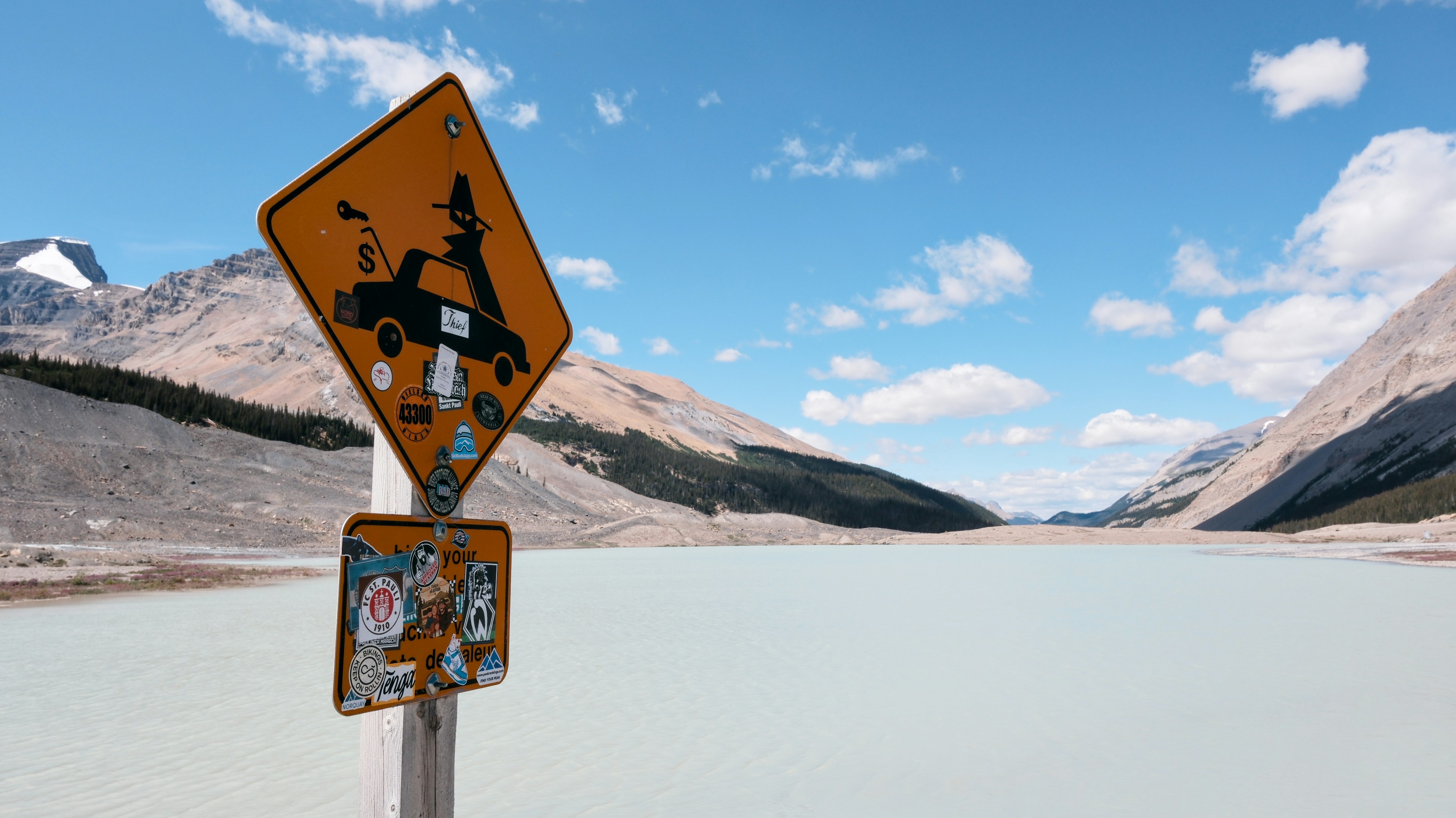 Stilled Signpost Over a Glacier-fed Basin