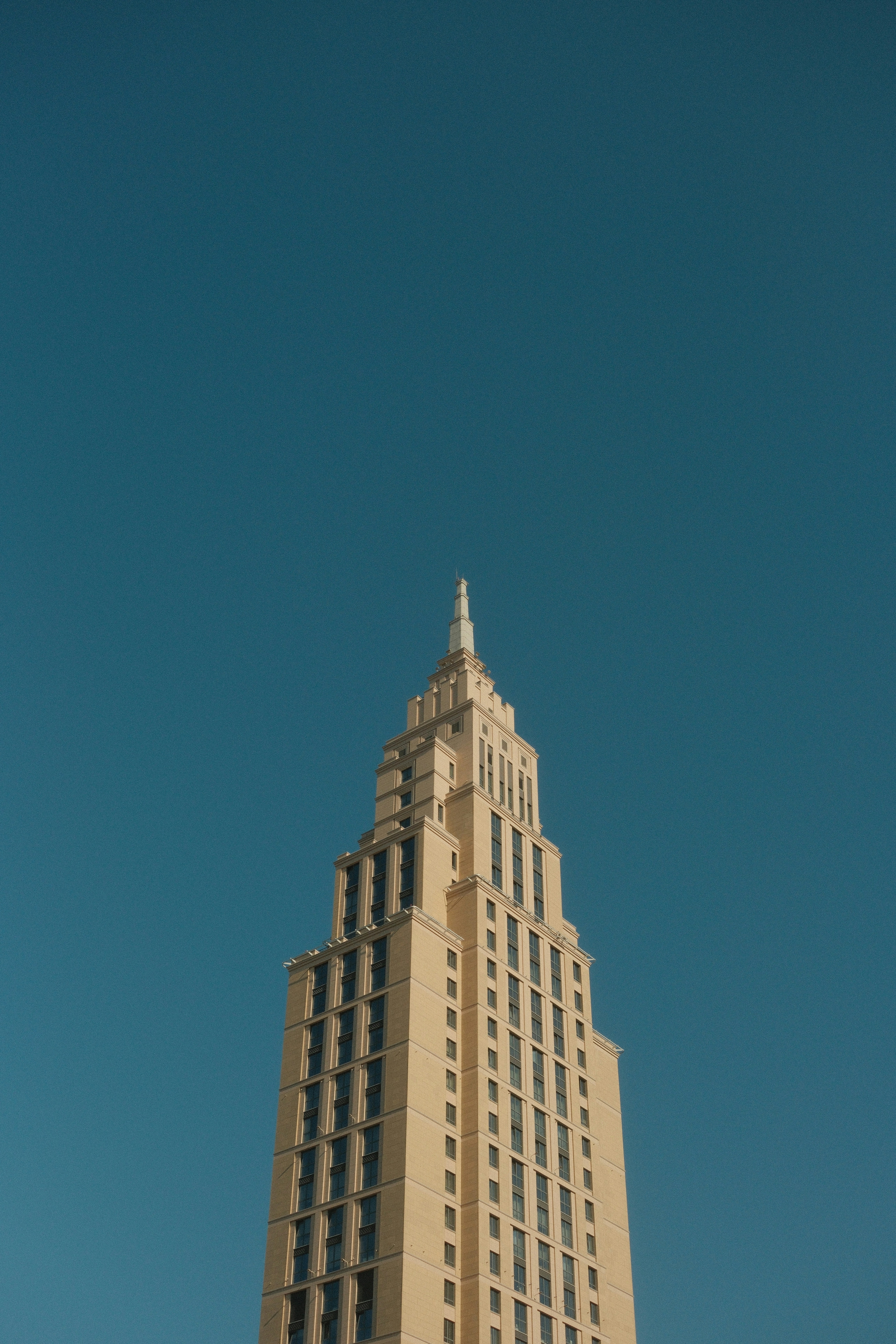 Spire Rising: A Towering Solitary Needle against a Velvet Sky