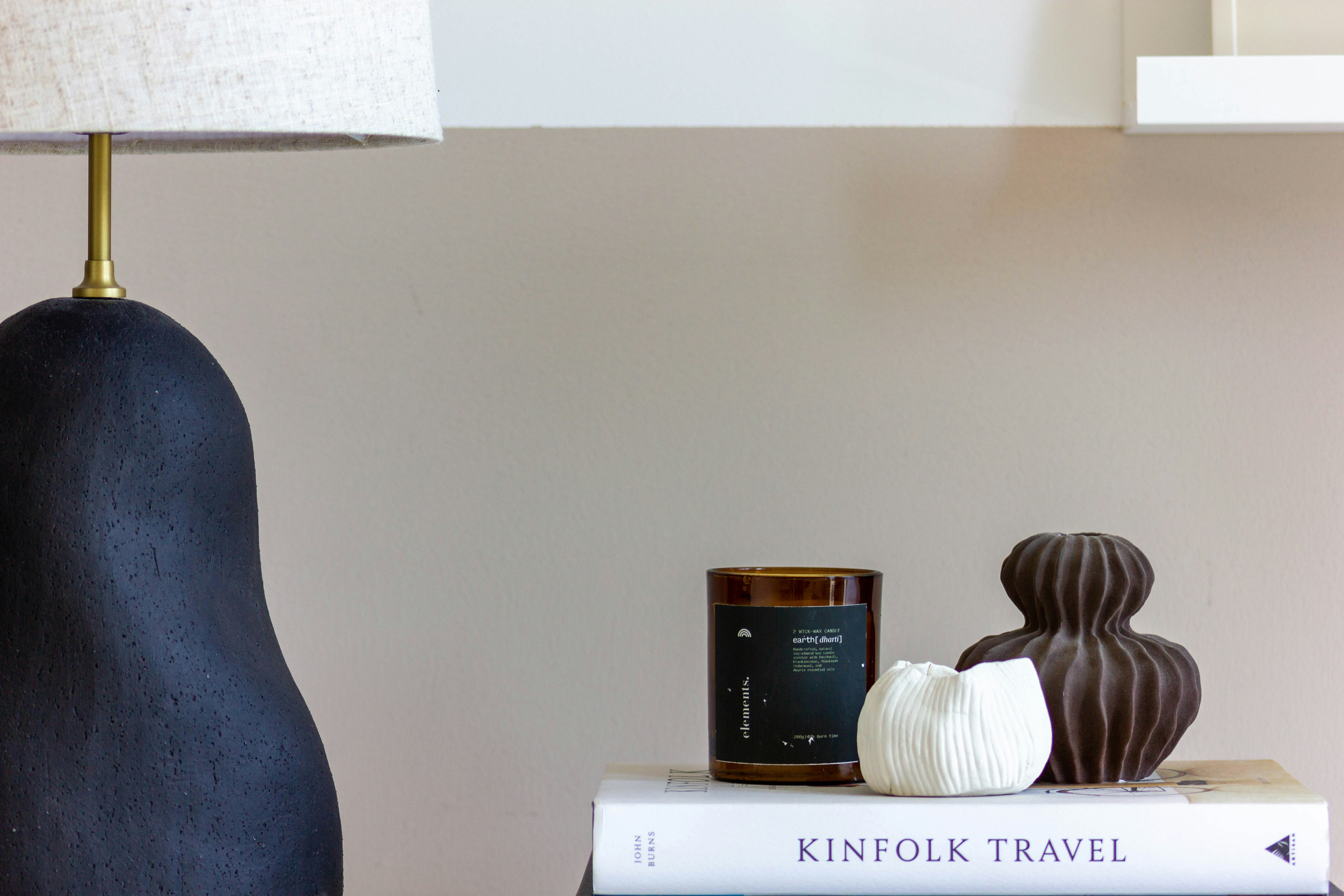 Calm Minimalism: Ceramic Forms and a Book in a Quiet Studio