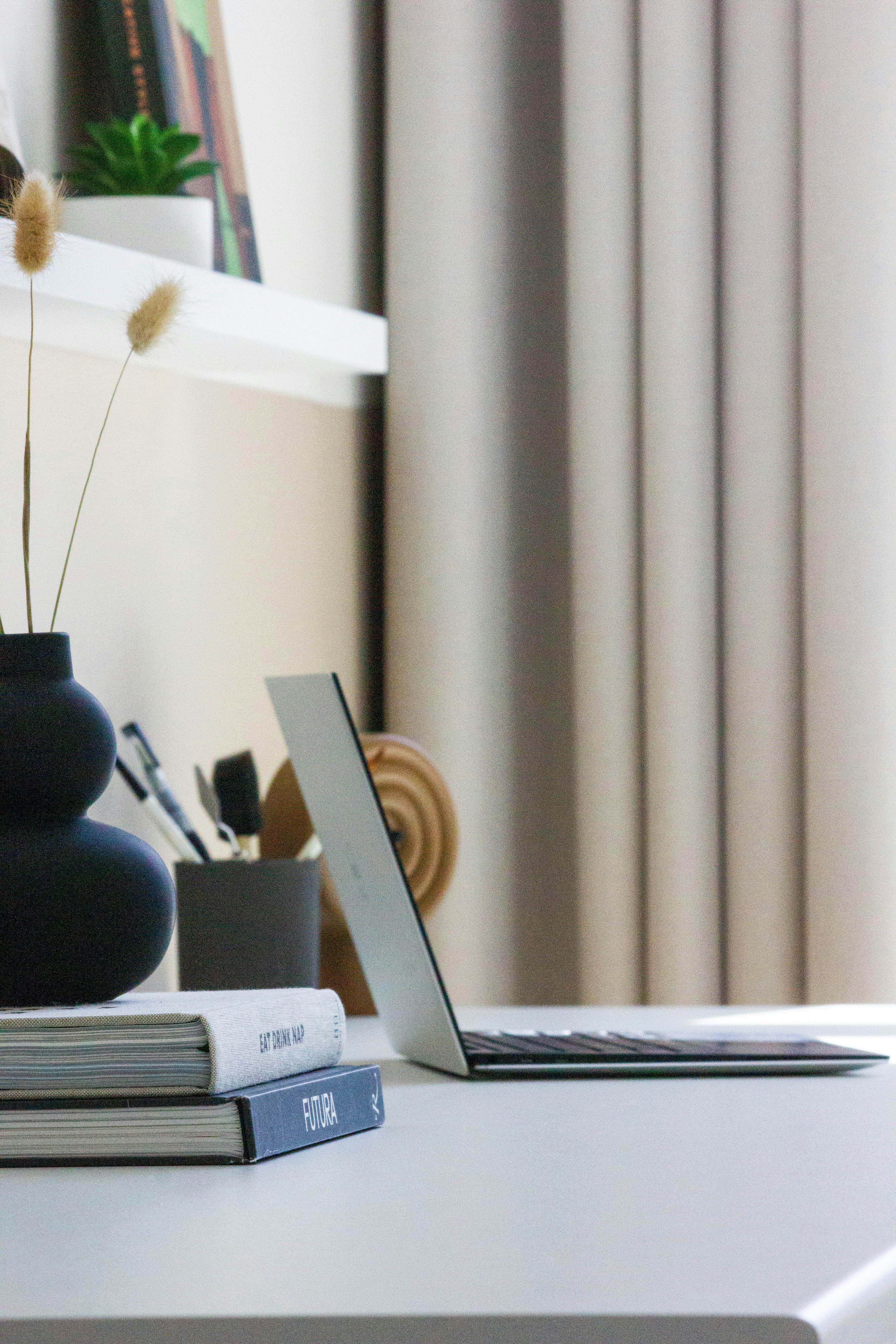 Desk Den: A Minimalist Workspace with Gear and Sketched Light