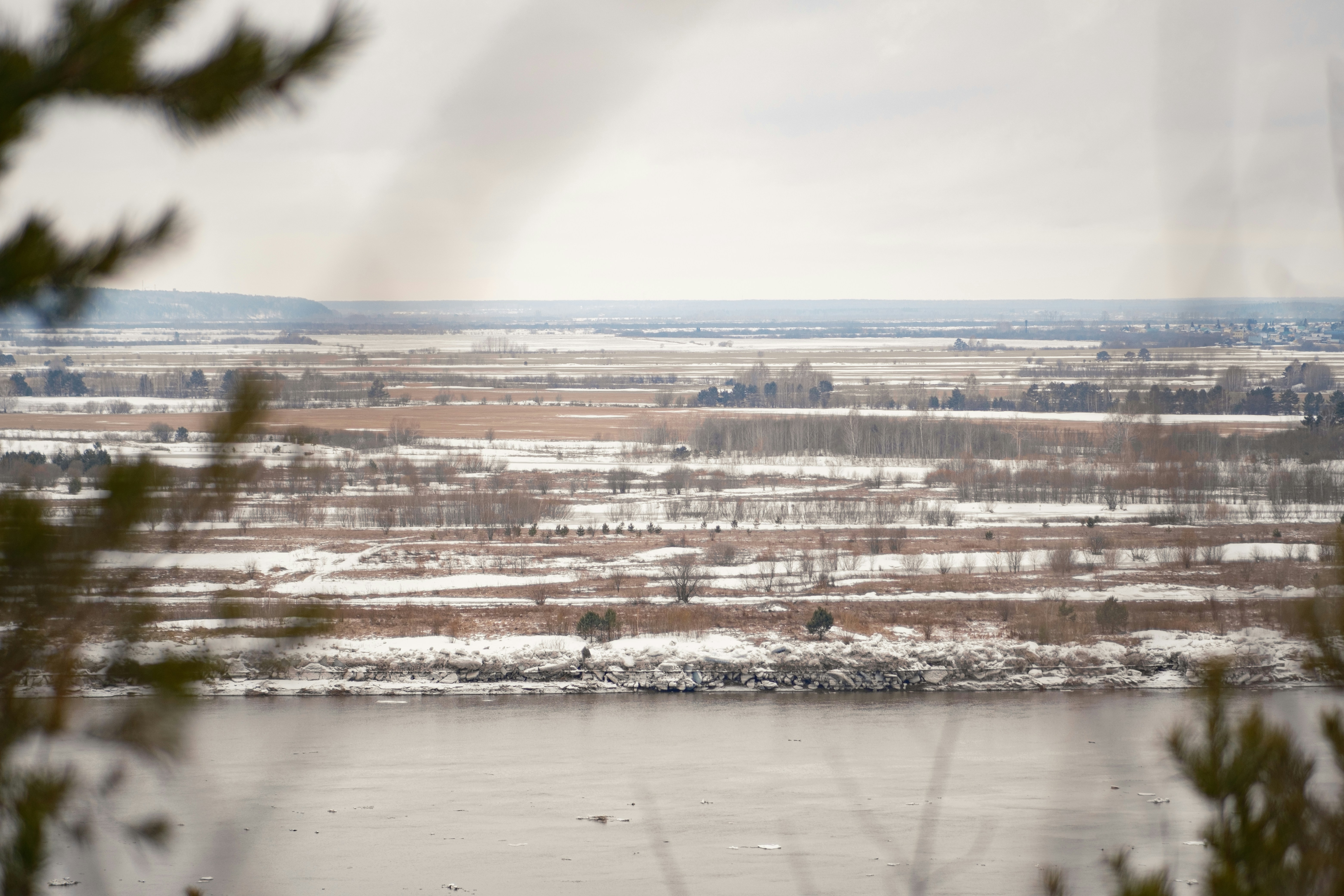 Glacial Ribbon: Winter Floodplain at Dusk
