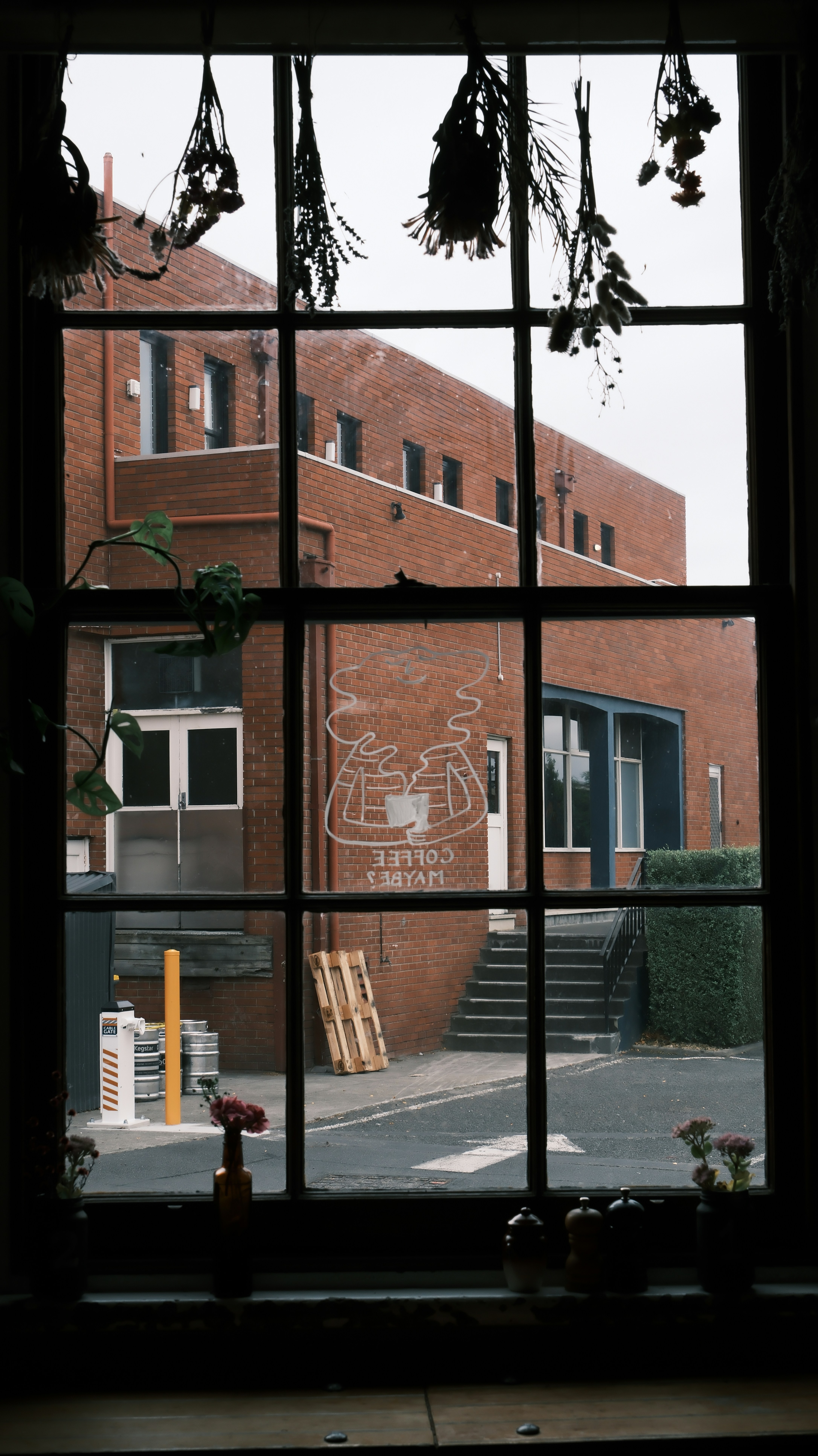 View from the Window: Brick Factory Through the Framed Grid