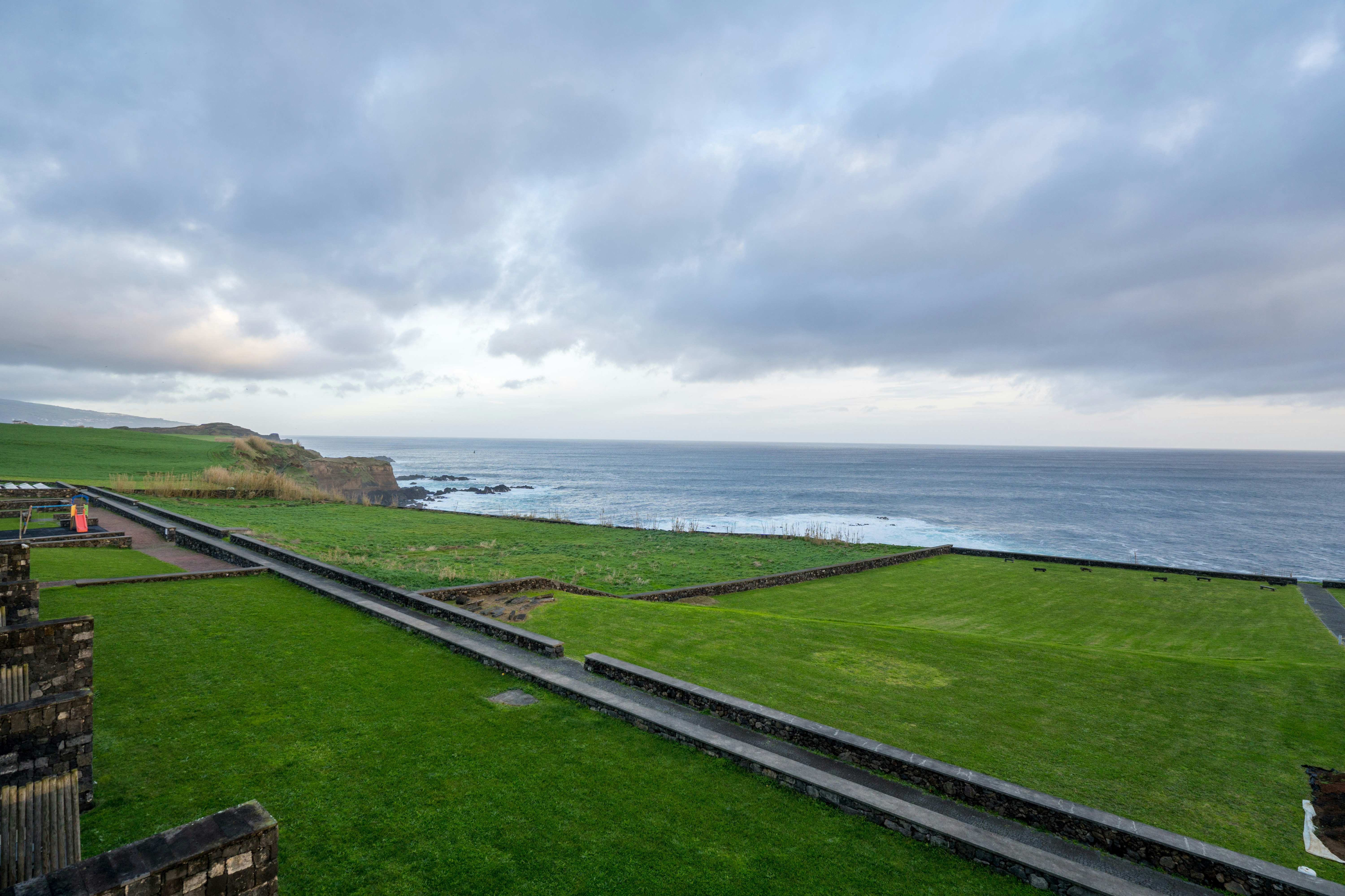 Clifftop Greenery Framed by the Sea