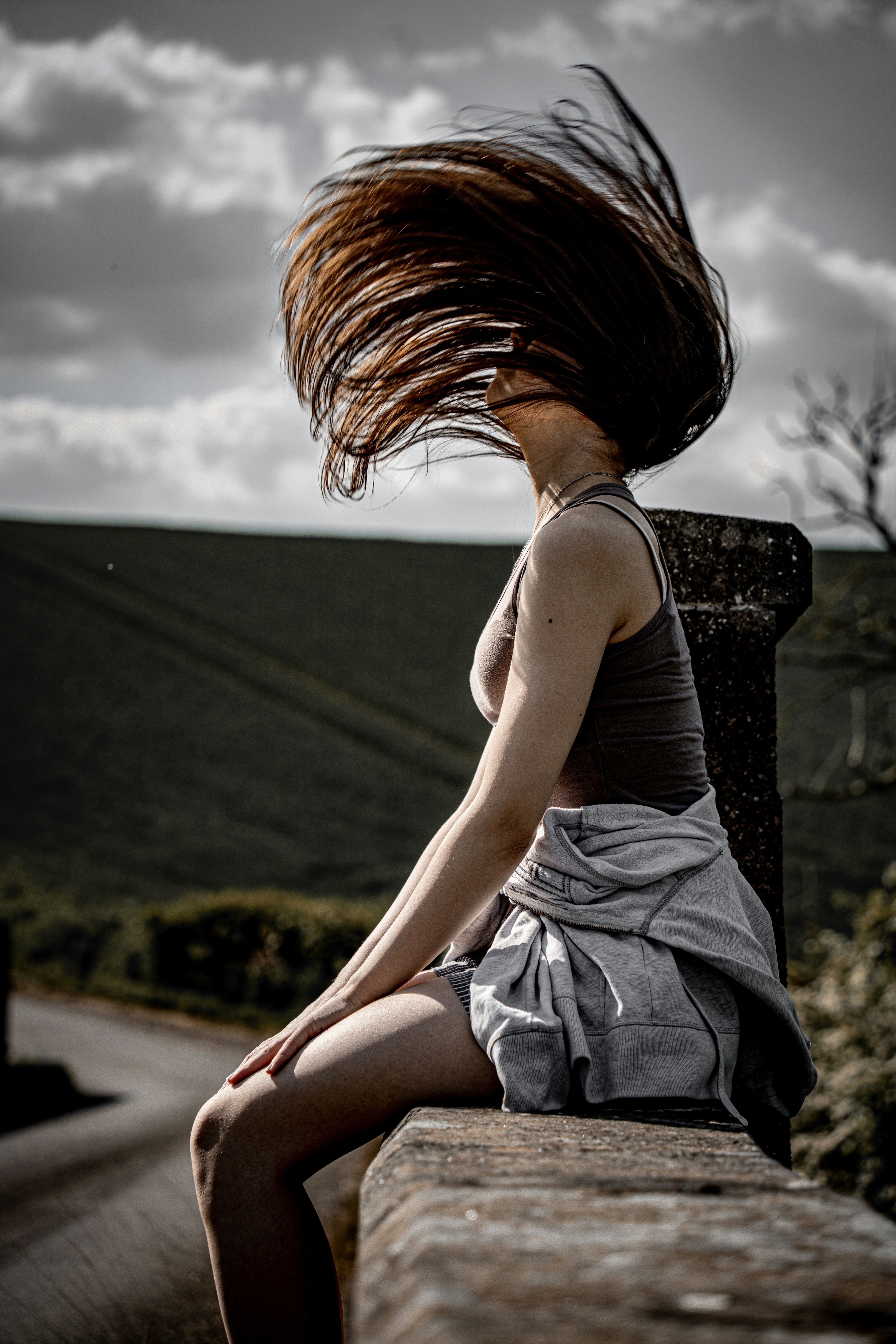 Flowing Wind, Quiet Edge: Portrait on the Bridge