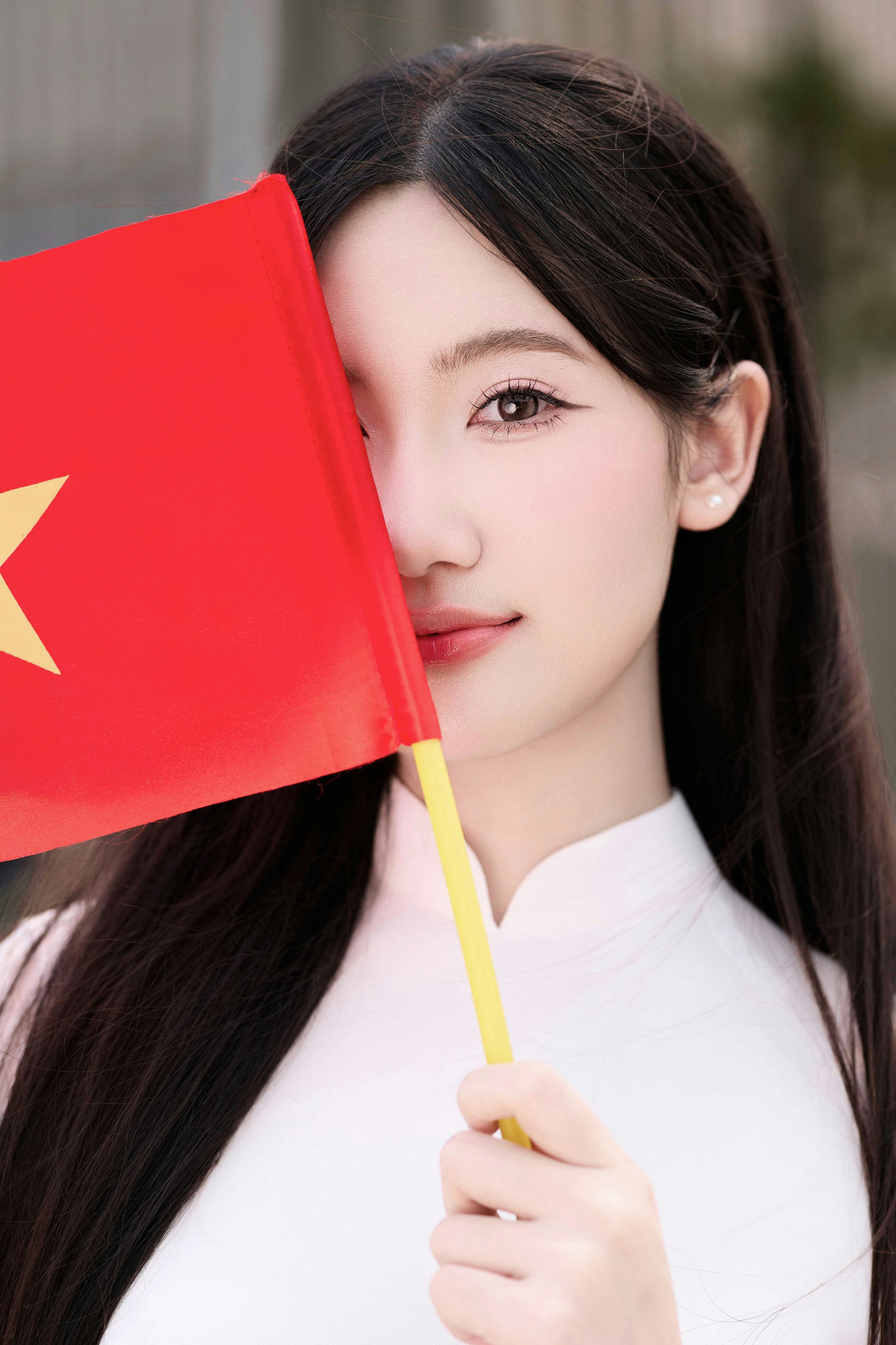 Partial Portrait of a Woman with a Red Flag
