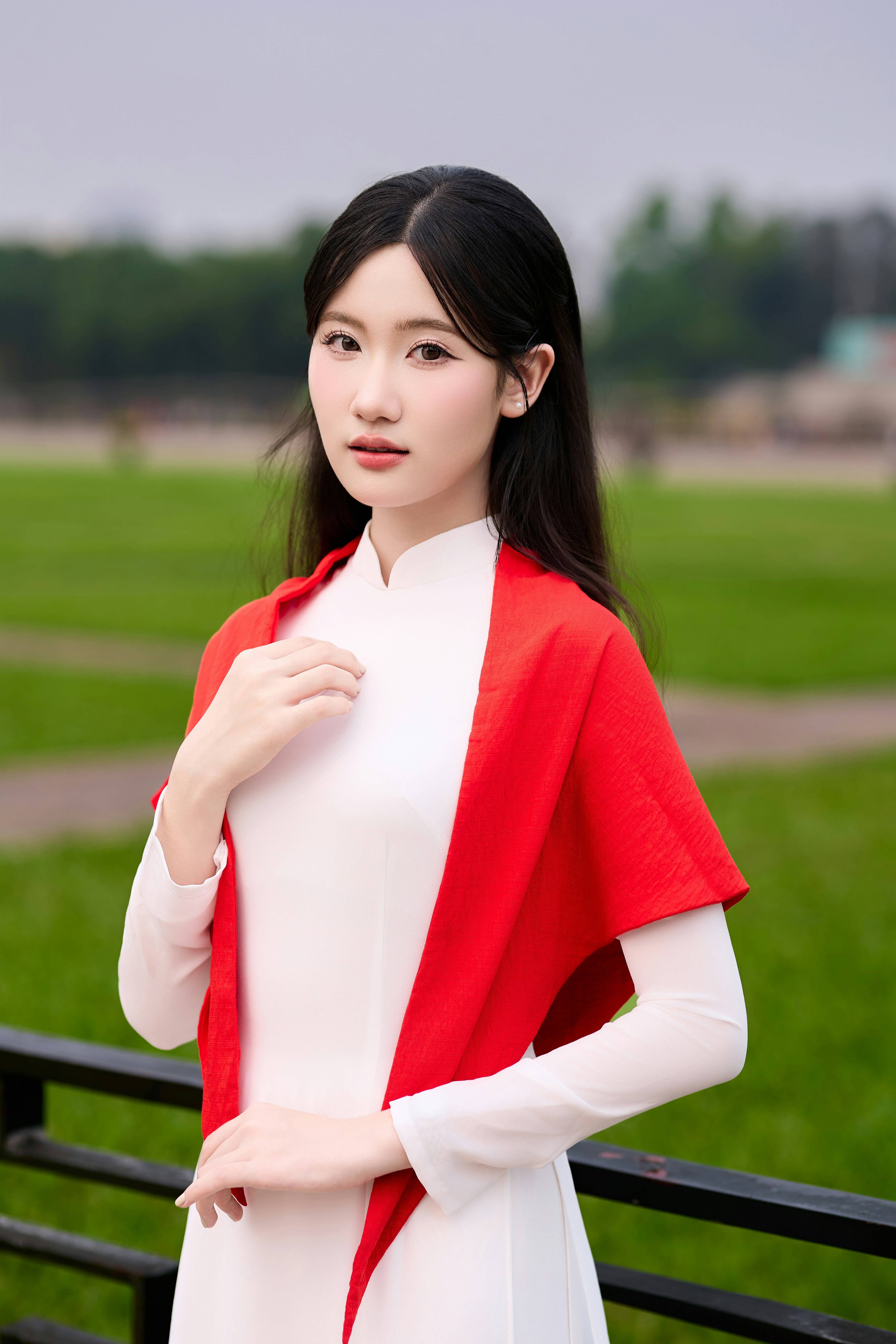 Portrait in a Field: Grace in Red and White