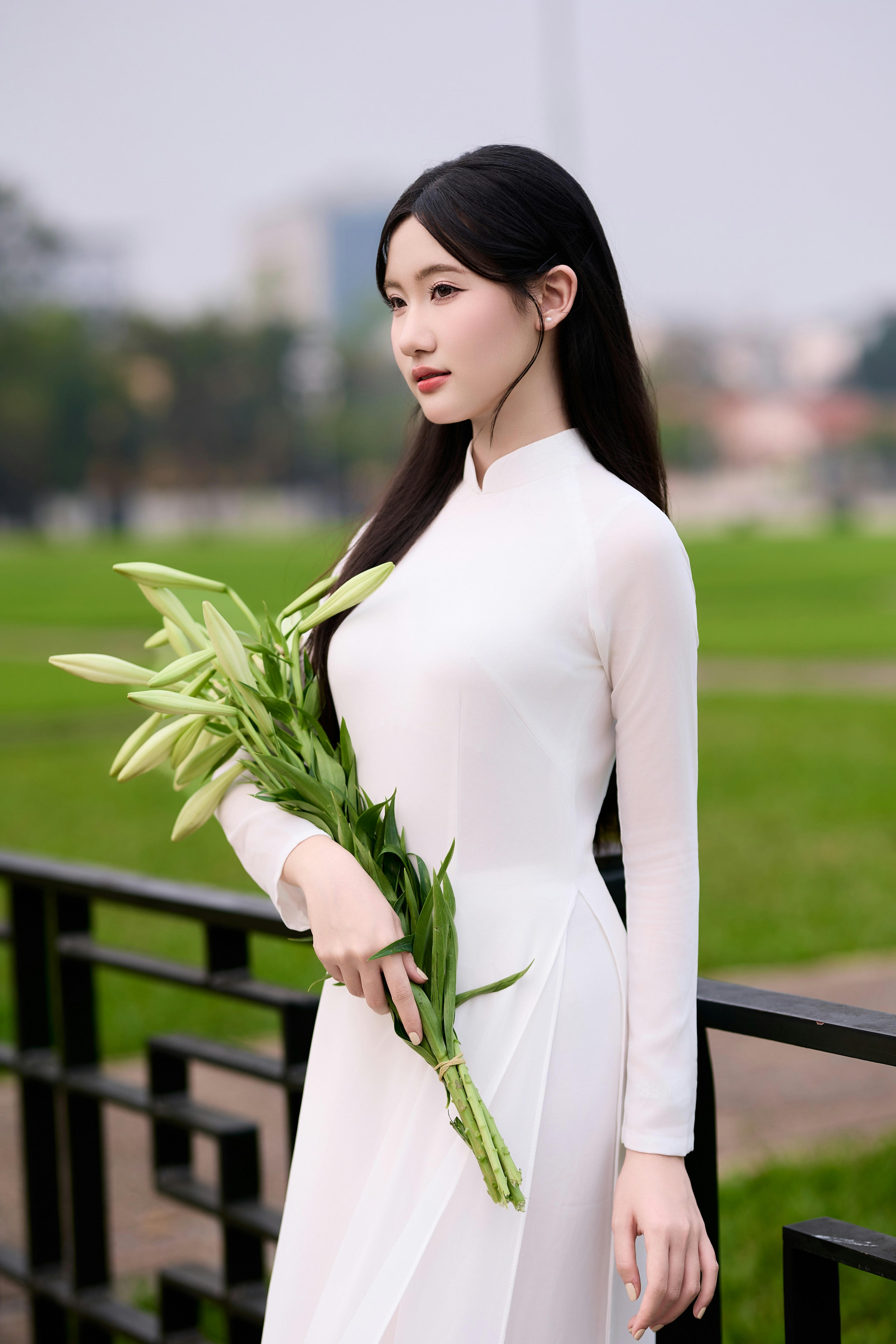 Portrait in White: A Quiet Moment with Lily Bouquet