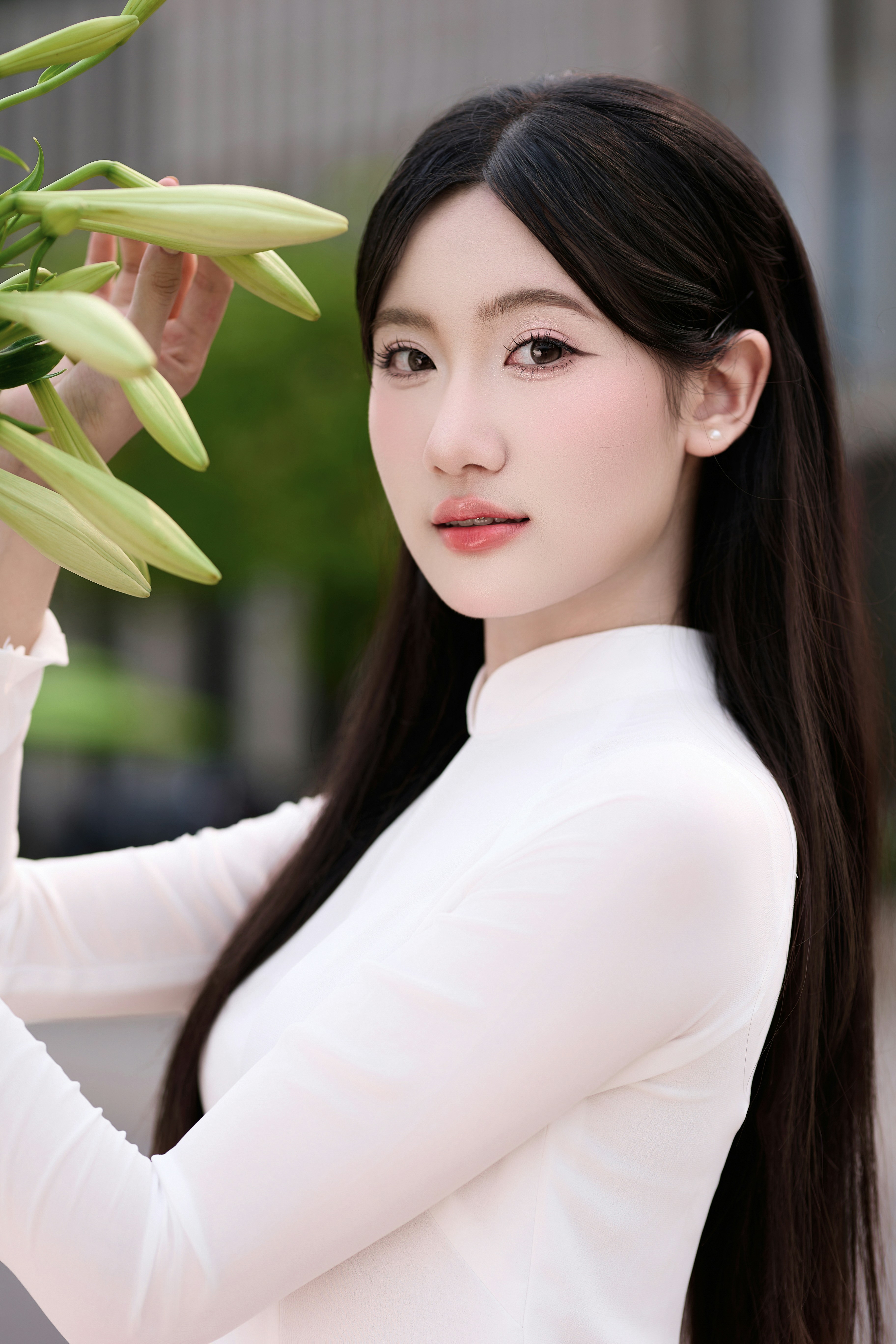 Portrait in White: Calm Gaze Among White Lilies