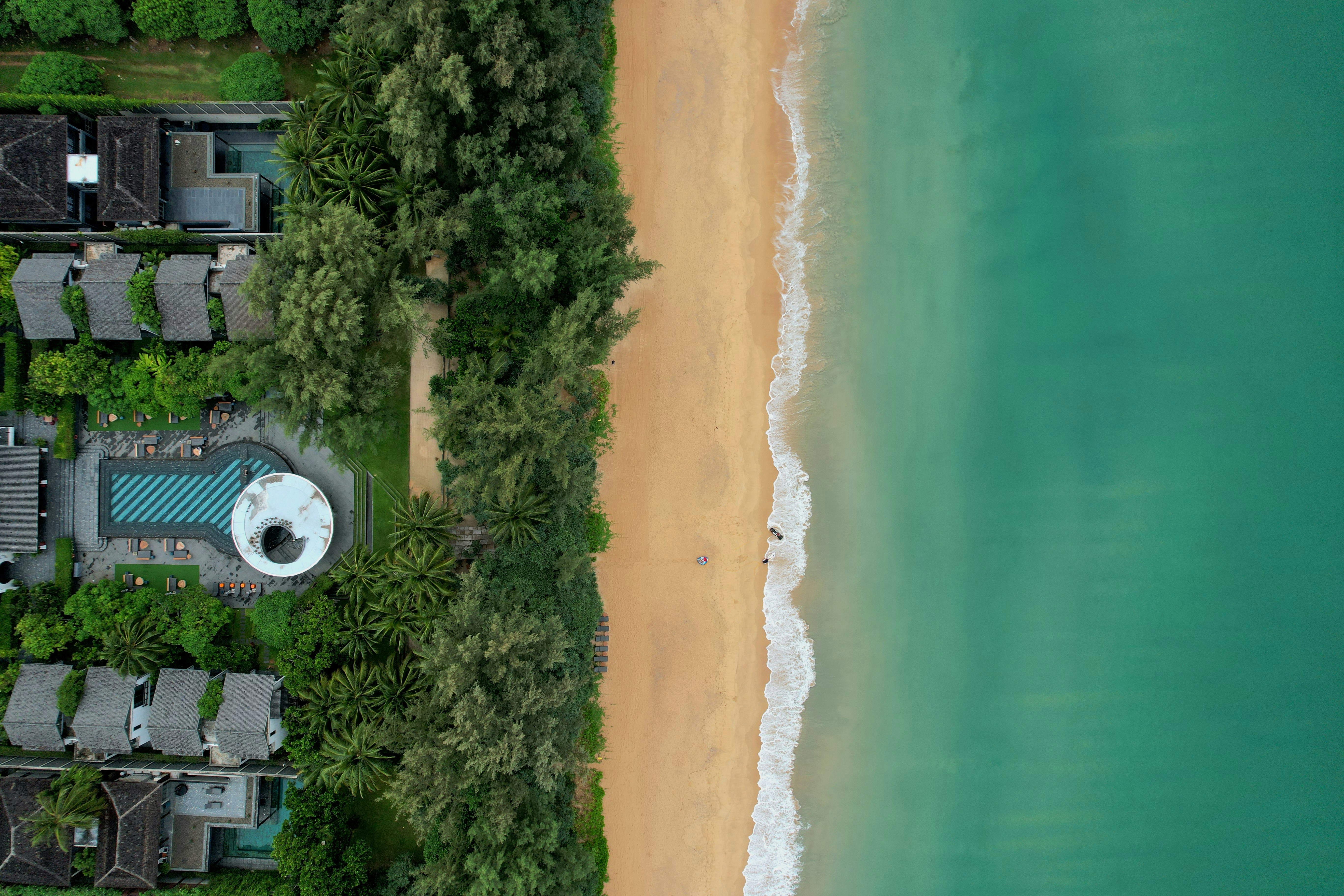 Coastal Resort from Above: Beach, Palm-lined Terrain and Turquoise Waters