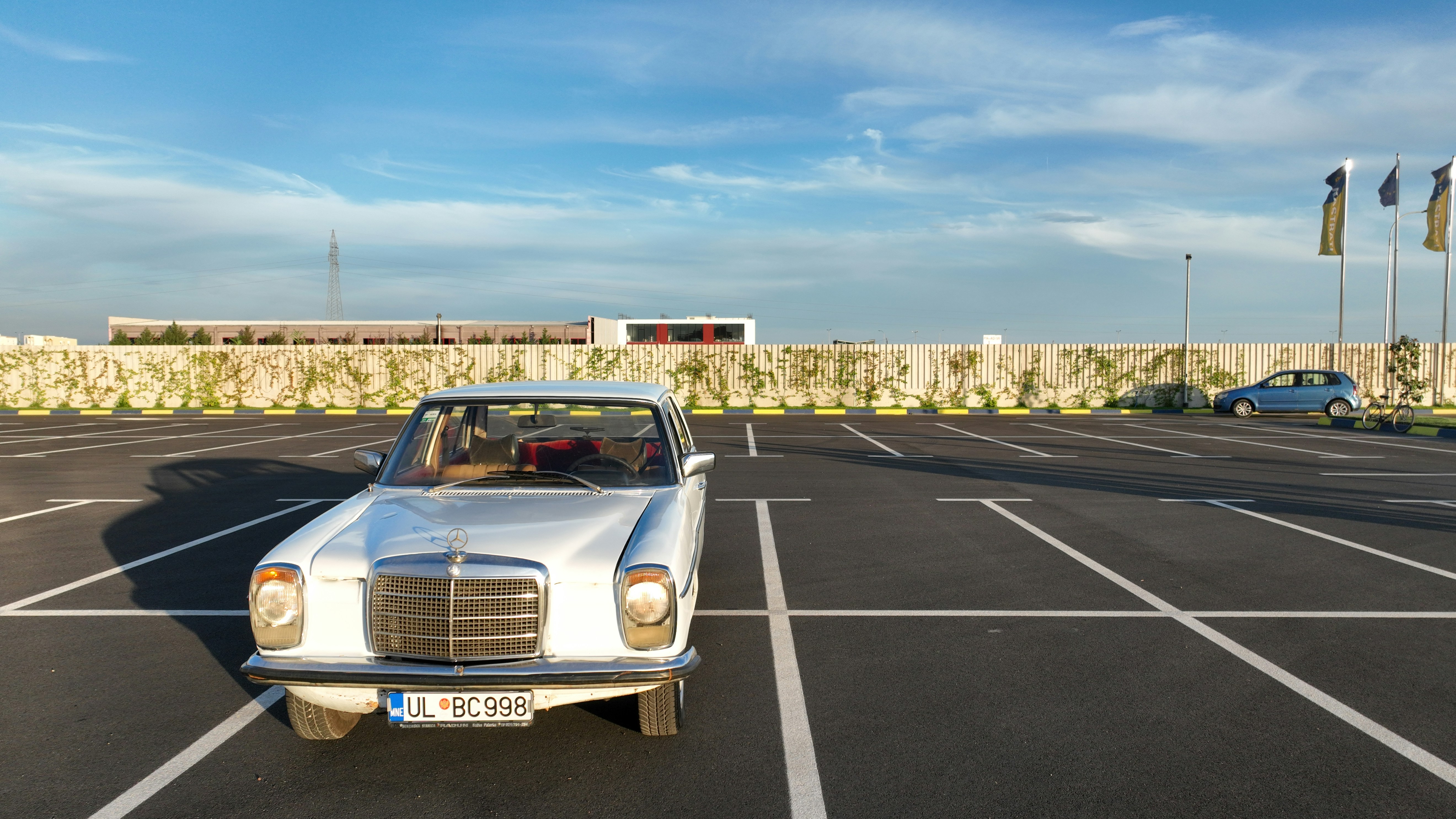 Serene Drive: Classic Mercedes in a Quiet Parking Lot