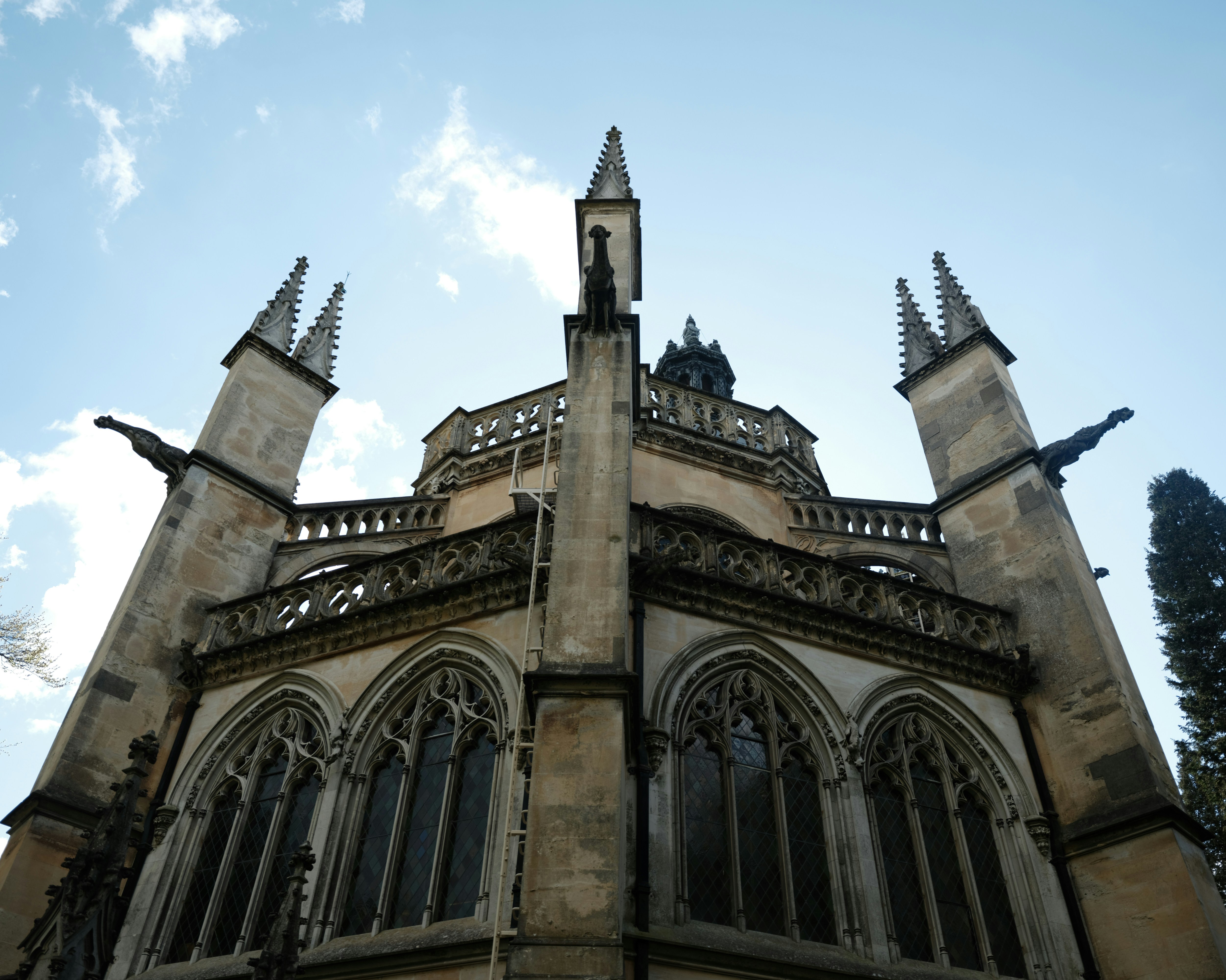 Gothic Facade Aerie: An Upward Gaze at Arched Windows and Spires
