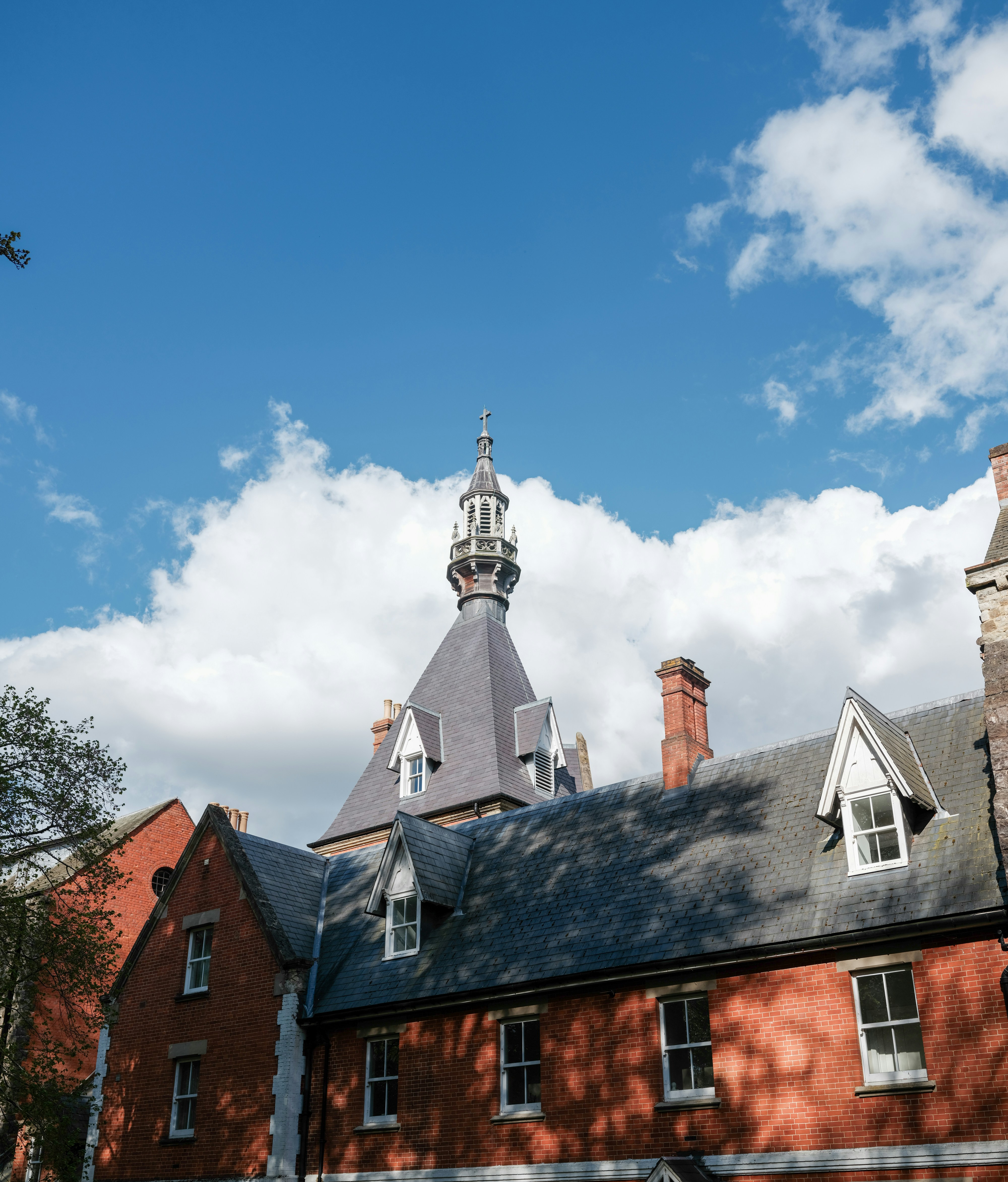 Steeple Tops and Brick Gables under a Bright Sky
