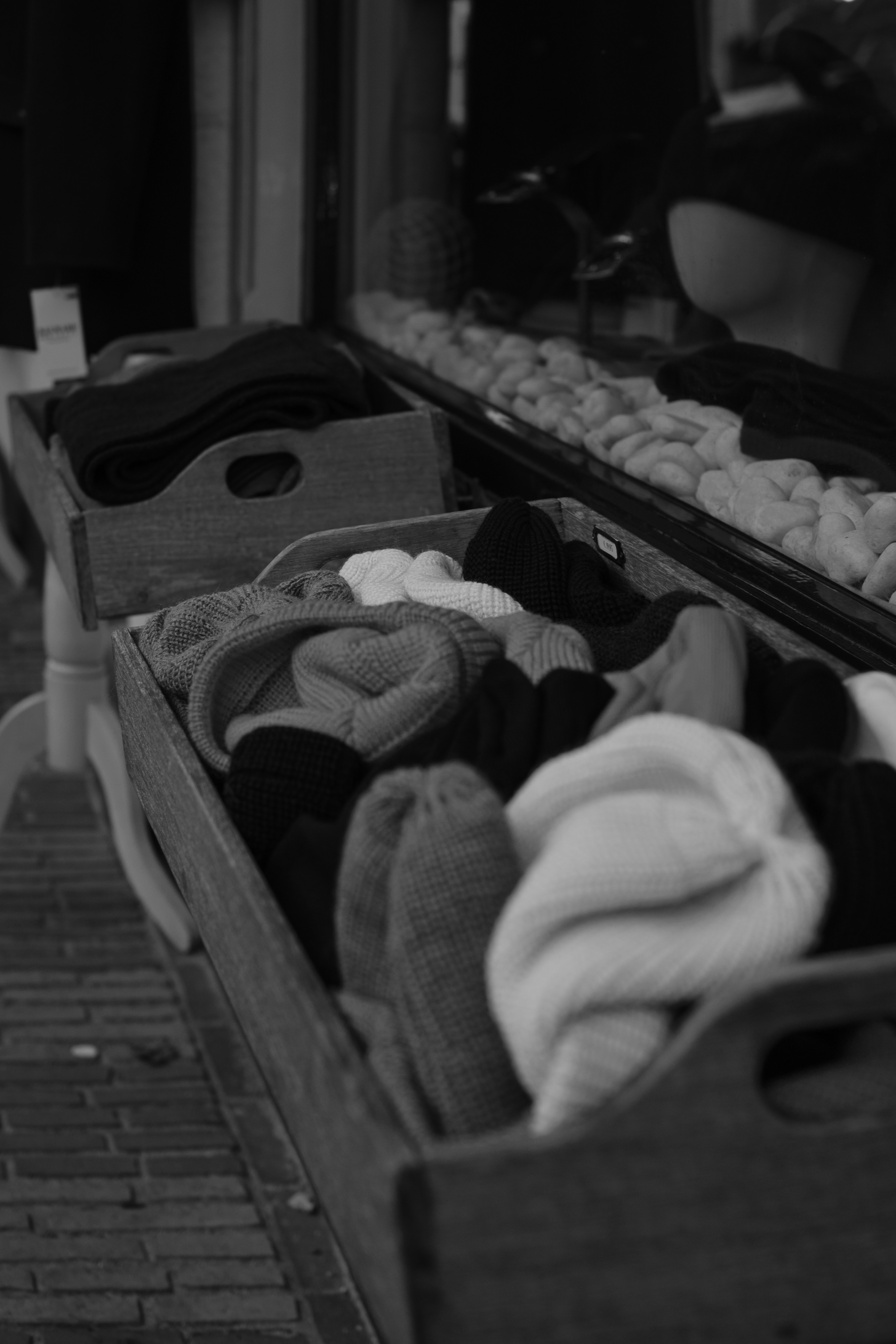 Heaped Woolen Layers in a Looming Shop Window