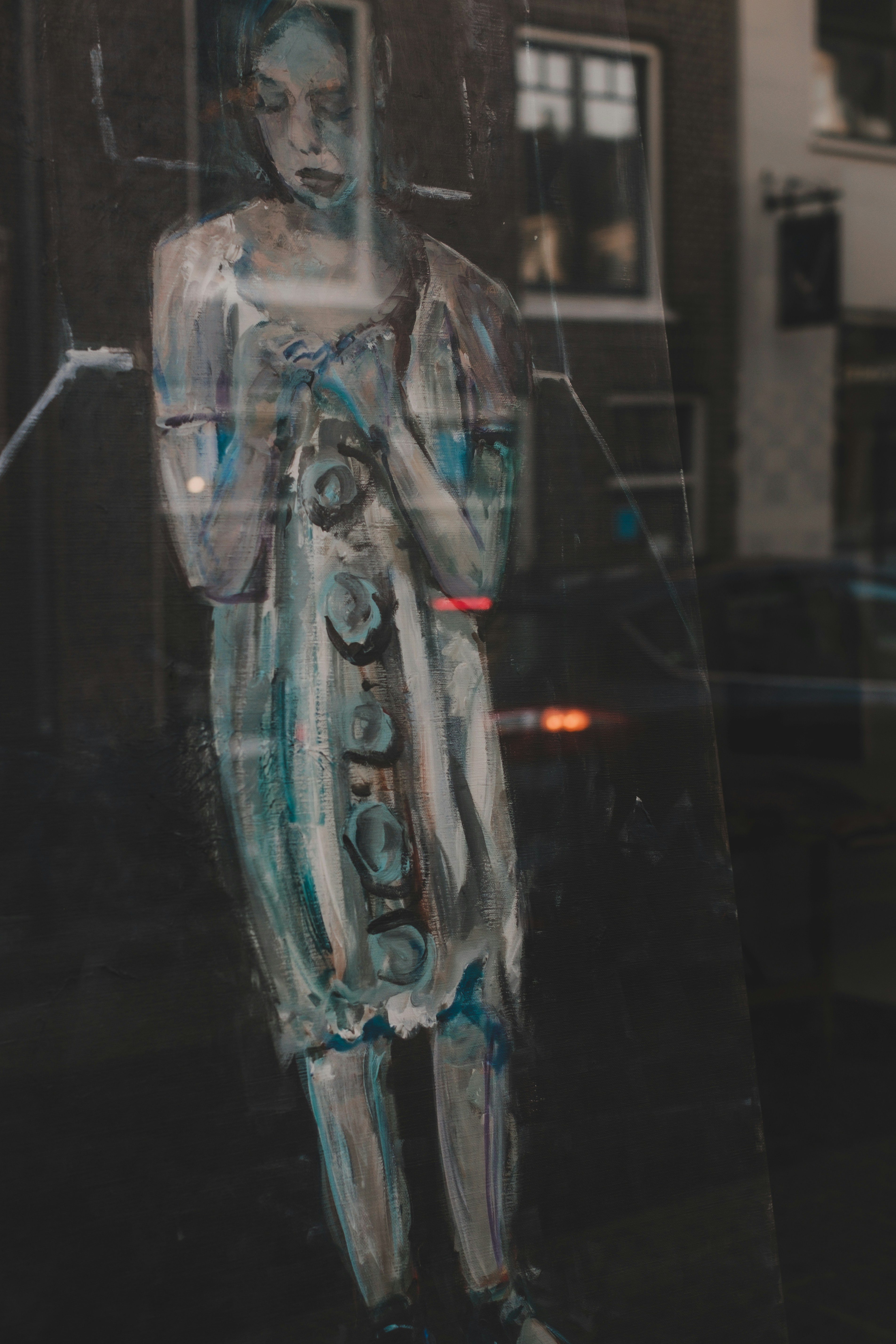 Echoes of a Painted Figure in a Glass Window
