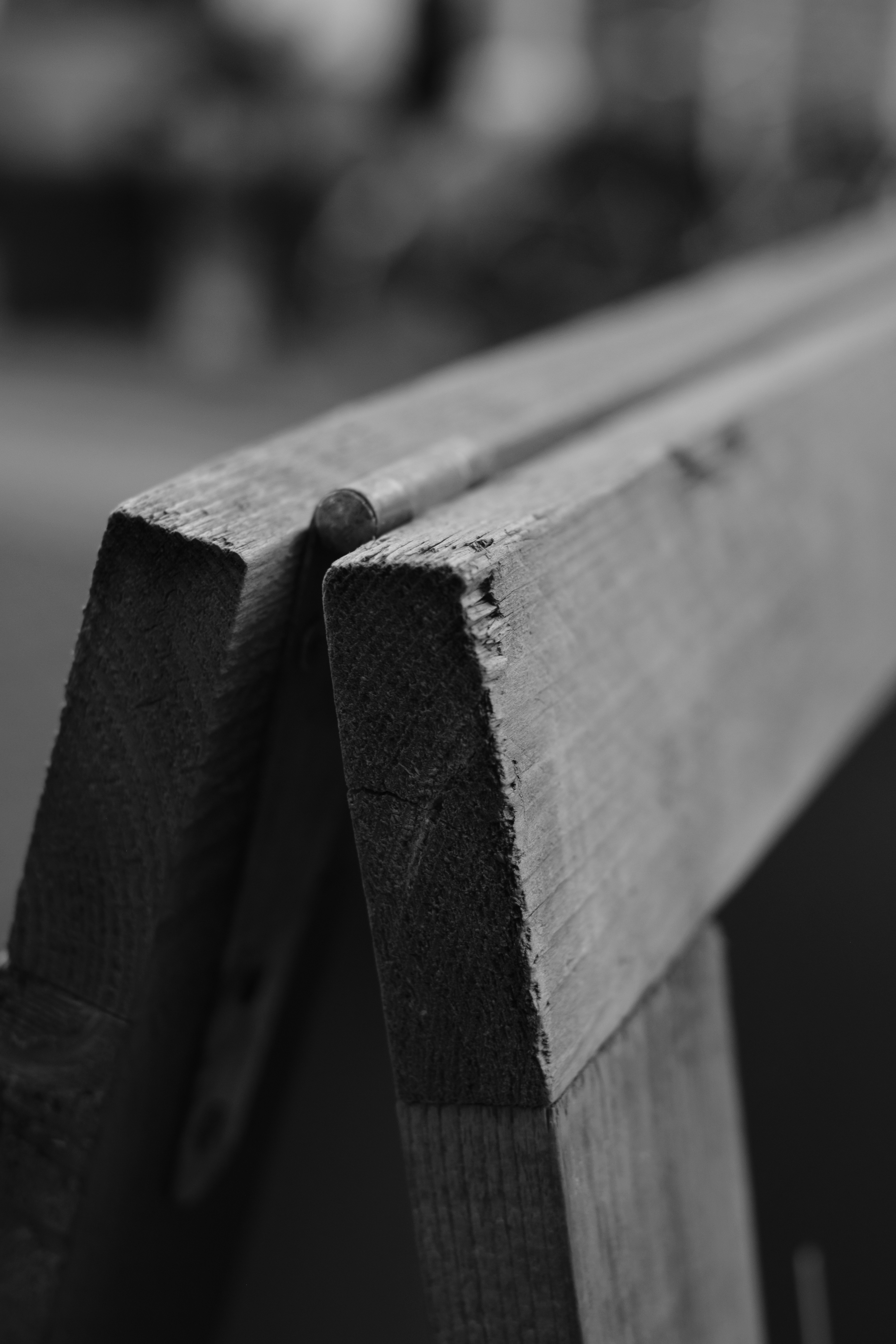 Weathered Pencil and Bench: A Close-Up of Quiet Wood Texture