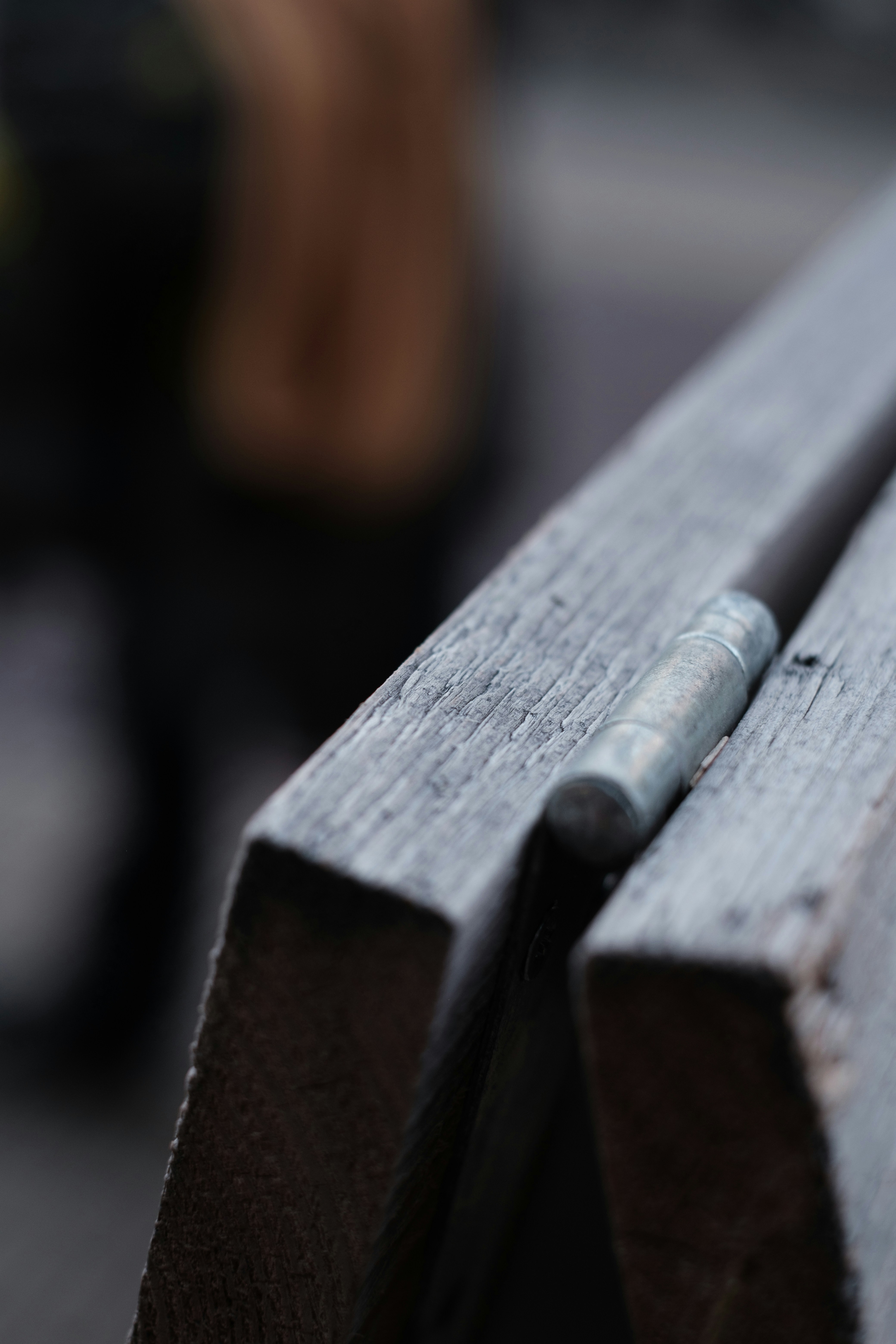 Weathered Pencil on Split Wooden Bench