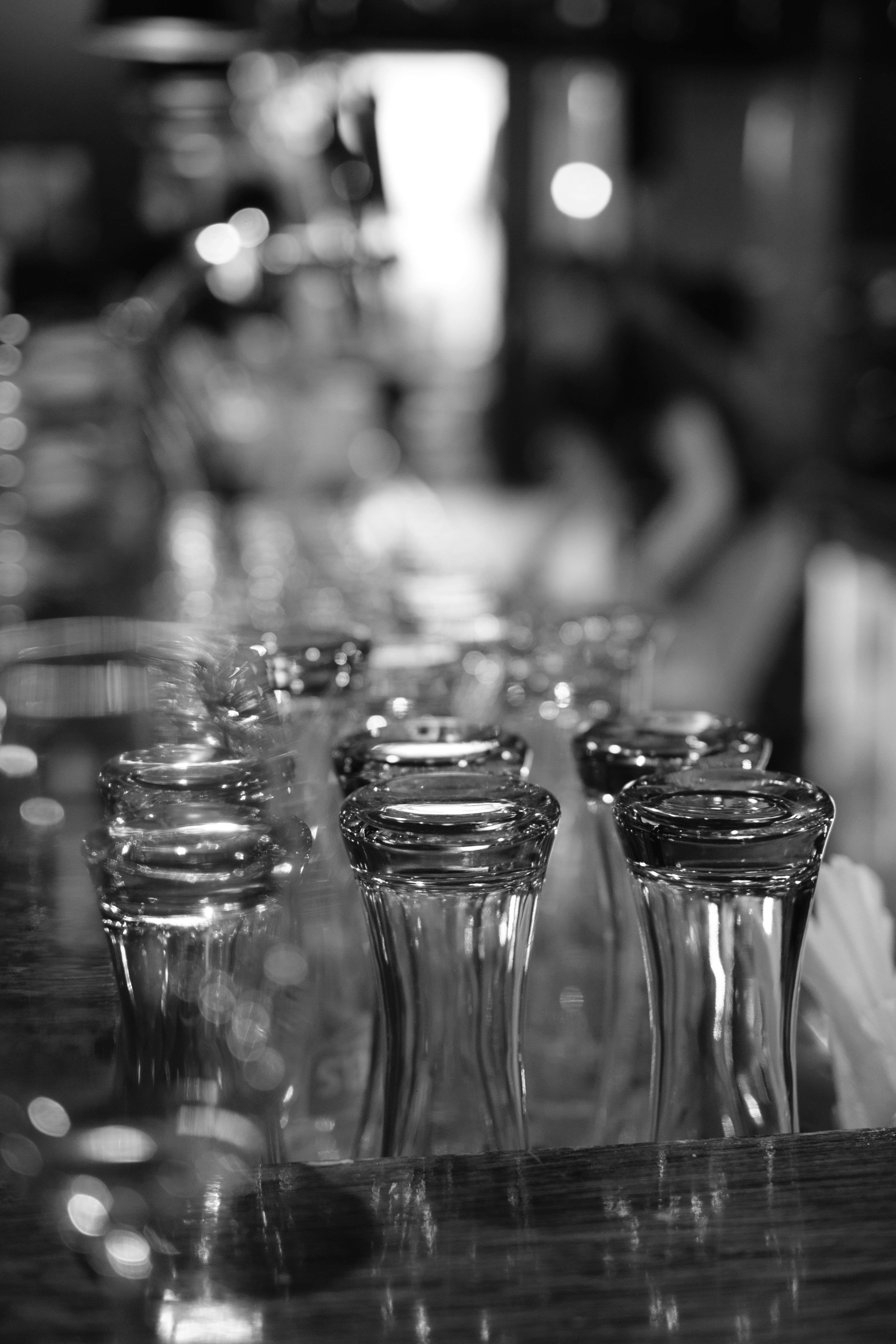 Shimmering Glass Rows at a Quiet Bar