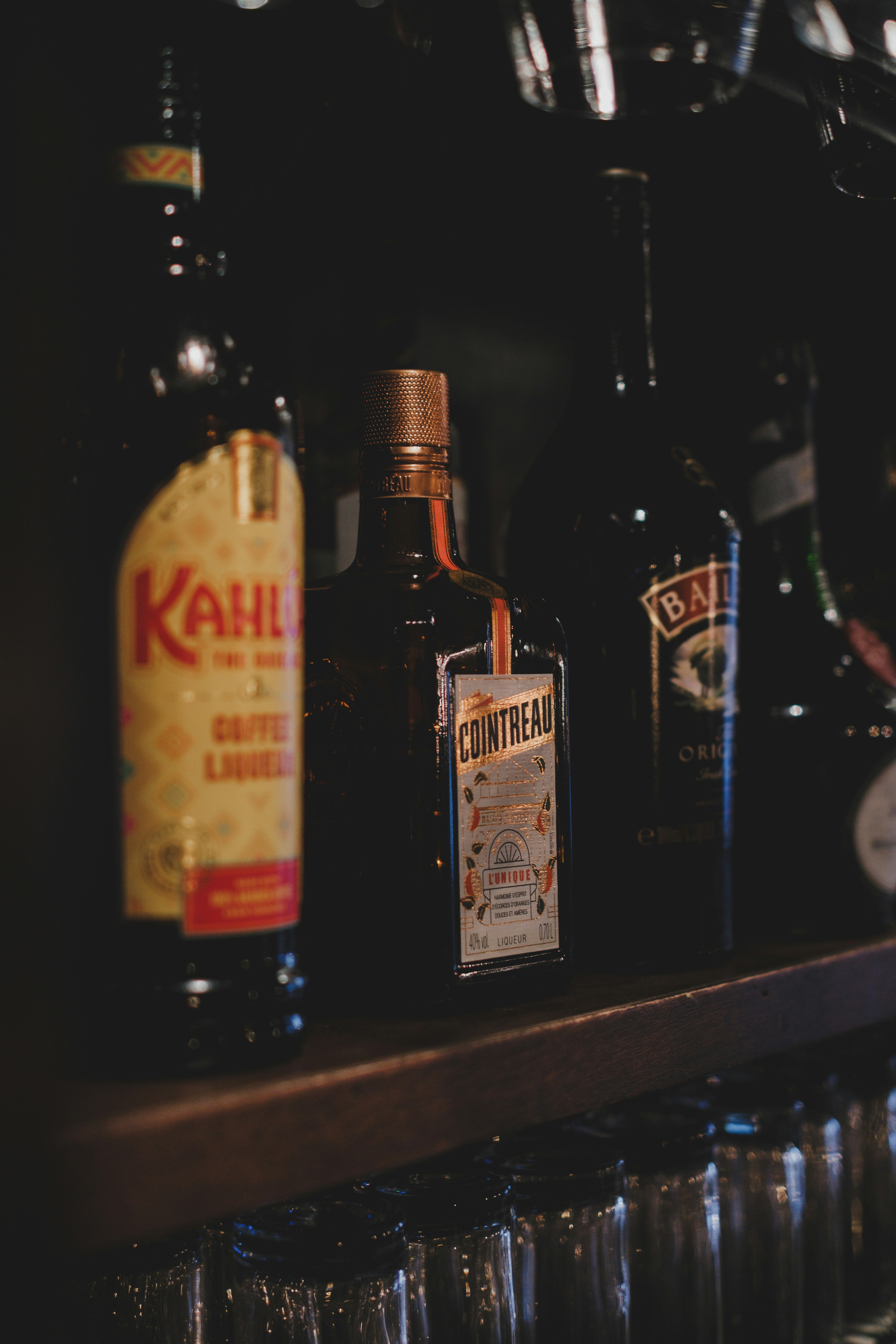 Centre-frame Spirits: A Quiet Shelf of Bottles